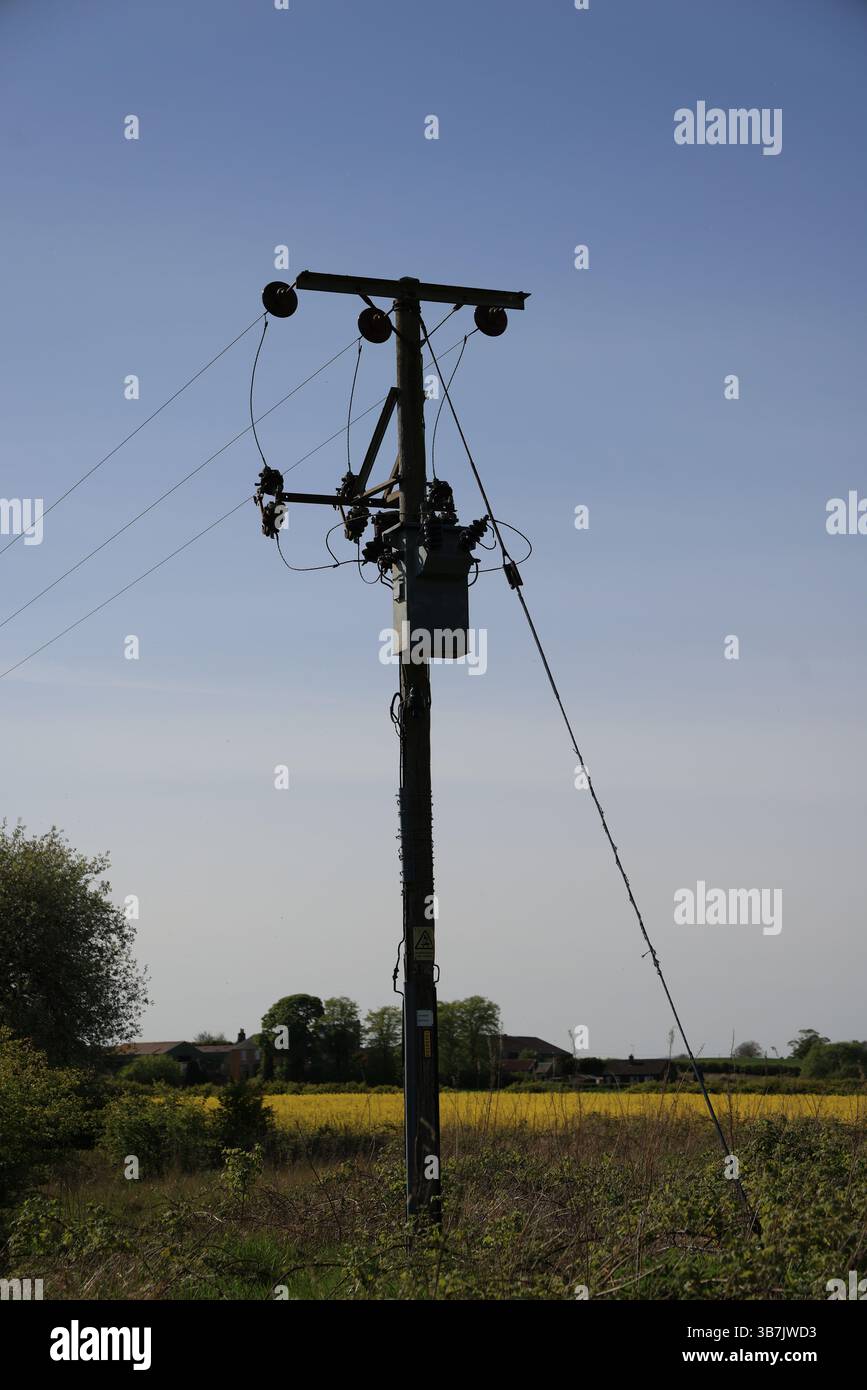 old wooden electricity post Stock Photo - Alamy