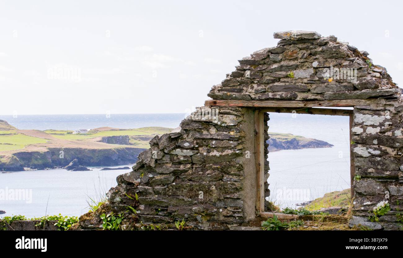 Headland viewed through derelict Irish Cottage Window Stock Photo - Alamy