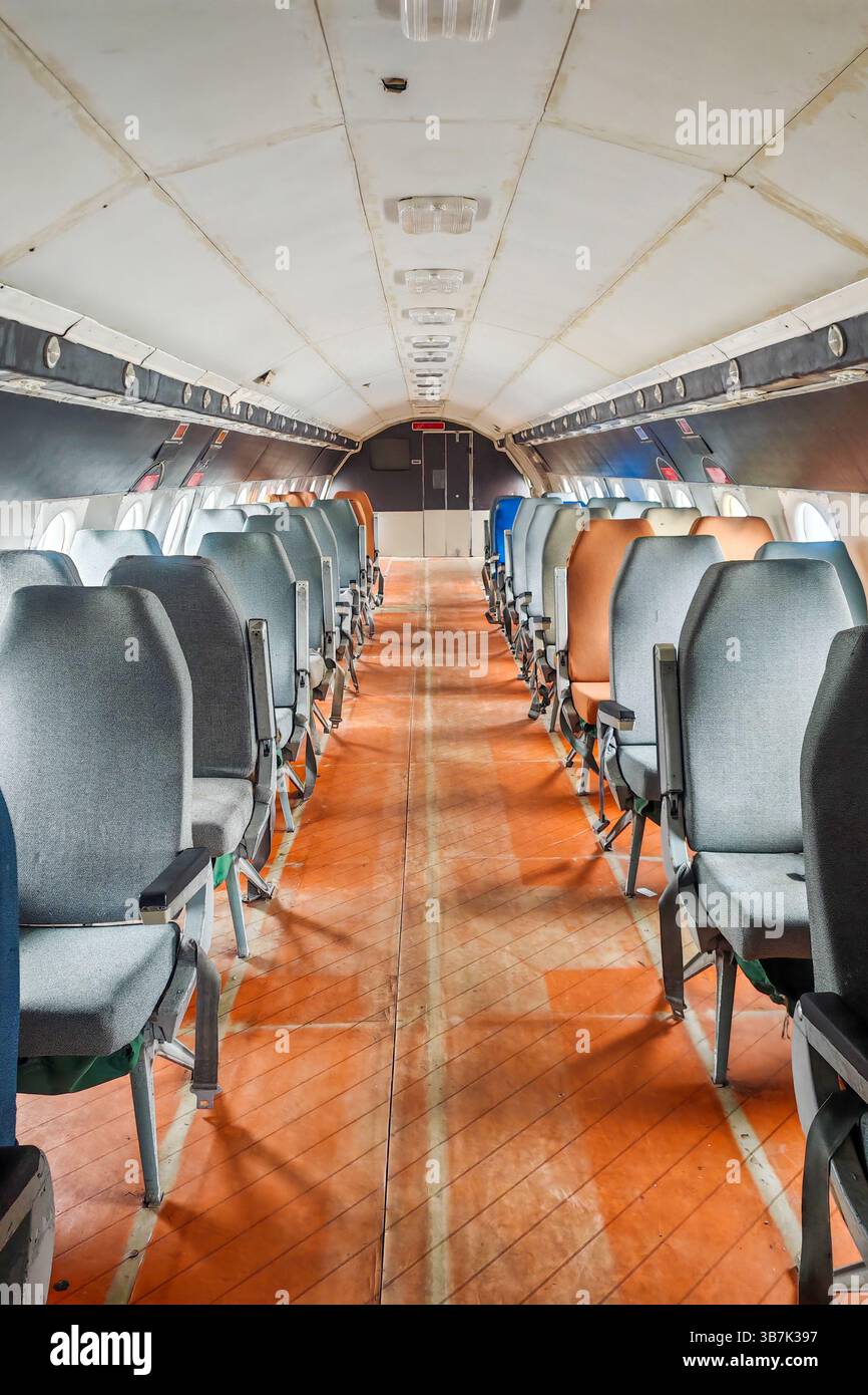 Vintage airplane cabin with retro seats interior Stock Photo - Alamy