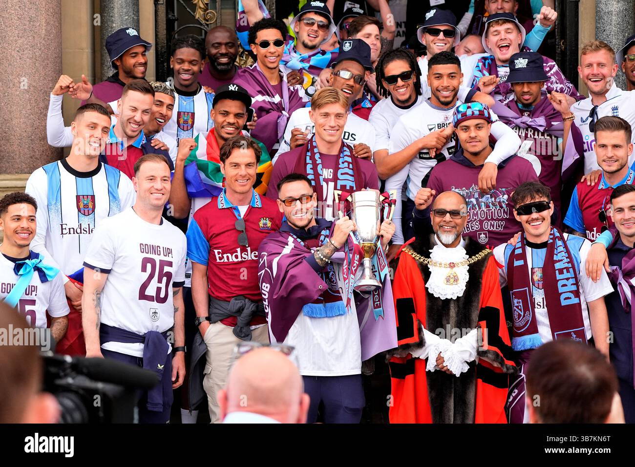 Burnley's Josh Brownhill (centre left), manager Scott Parker and team ...