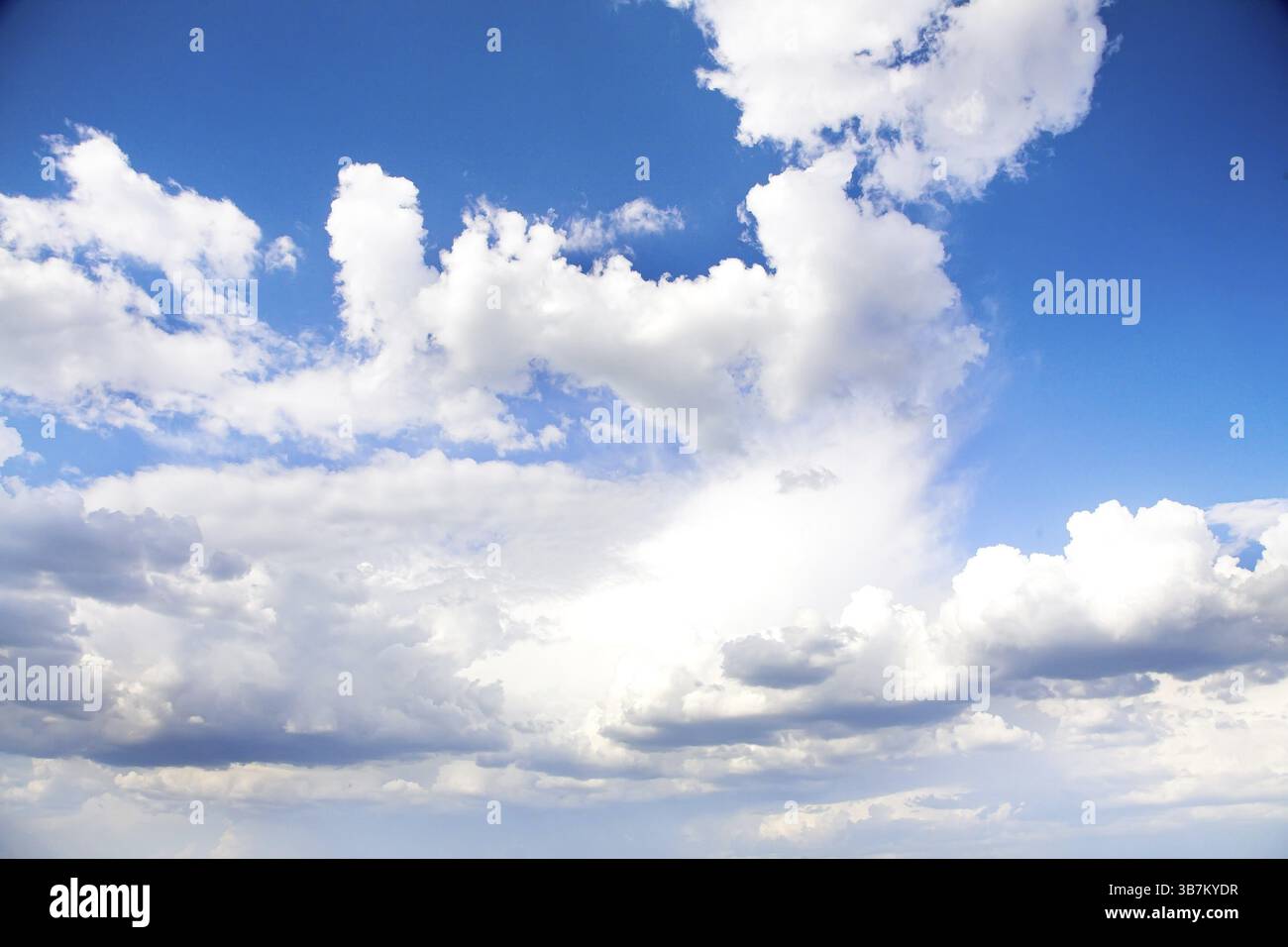 Clean blue sky background with white clouds Stock Photo - Alamy