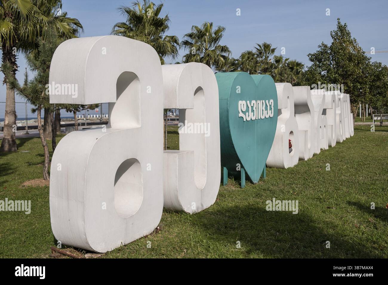 Batumi lettering on the beach promenade Stock Photo - Alamy