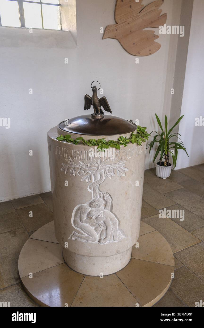 Baptismal font with relief, tree, snake, Adam, Eve, St Mary is the ...
