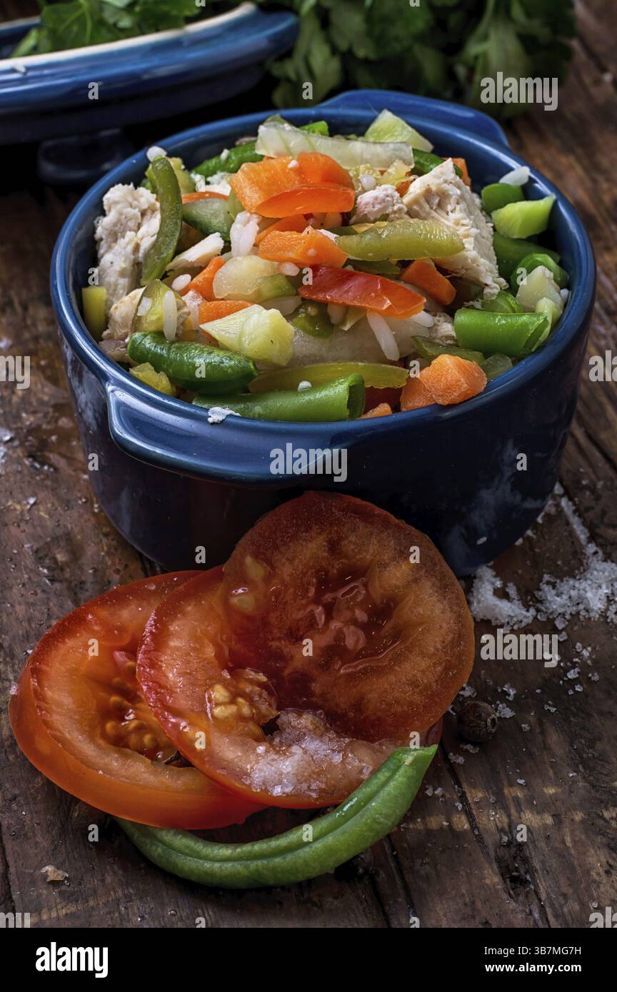 Fragrant vegetable stew cooked in a ceramic pot Stock Photo - Alamy