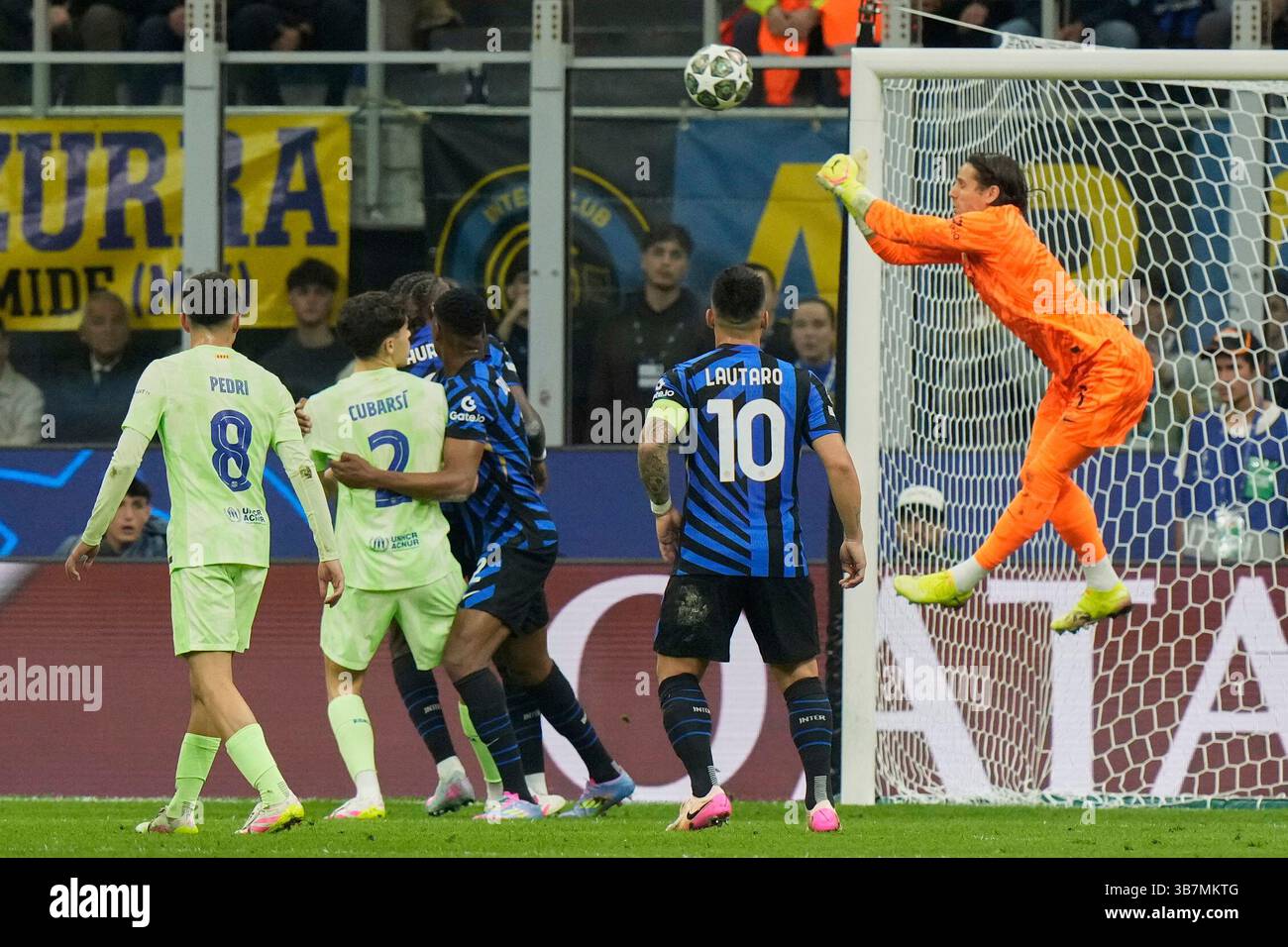 Inter Milan's goalkeeper Yann Sommer, right, clears the ball during the ...
