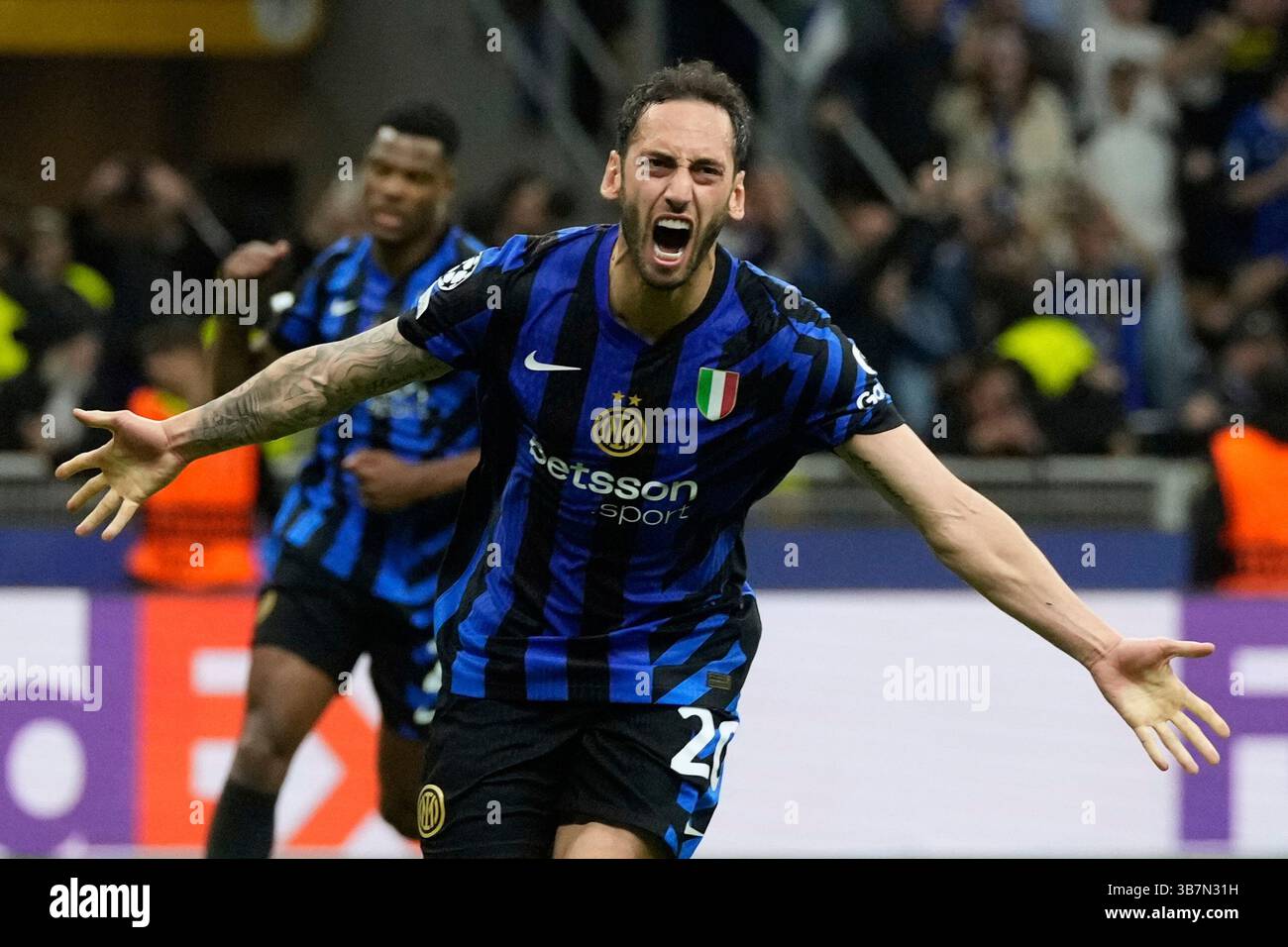 Inter Milan's Hakan Calhanoglu celebrates after scoring his side's ...