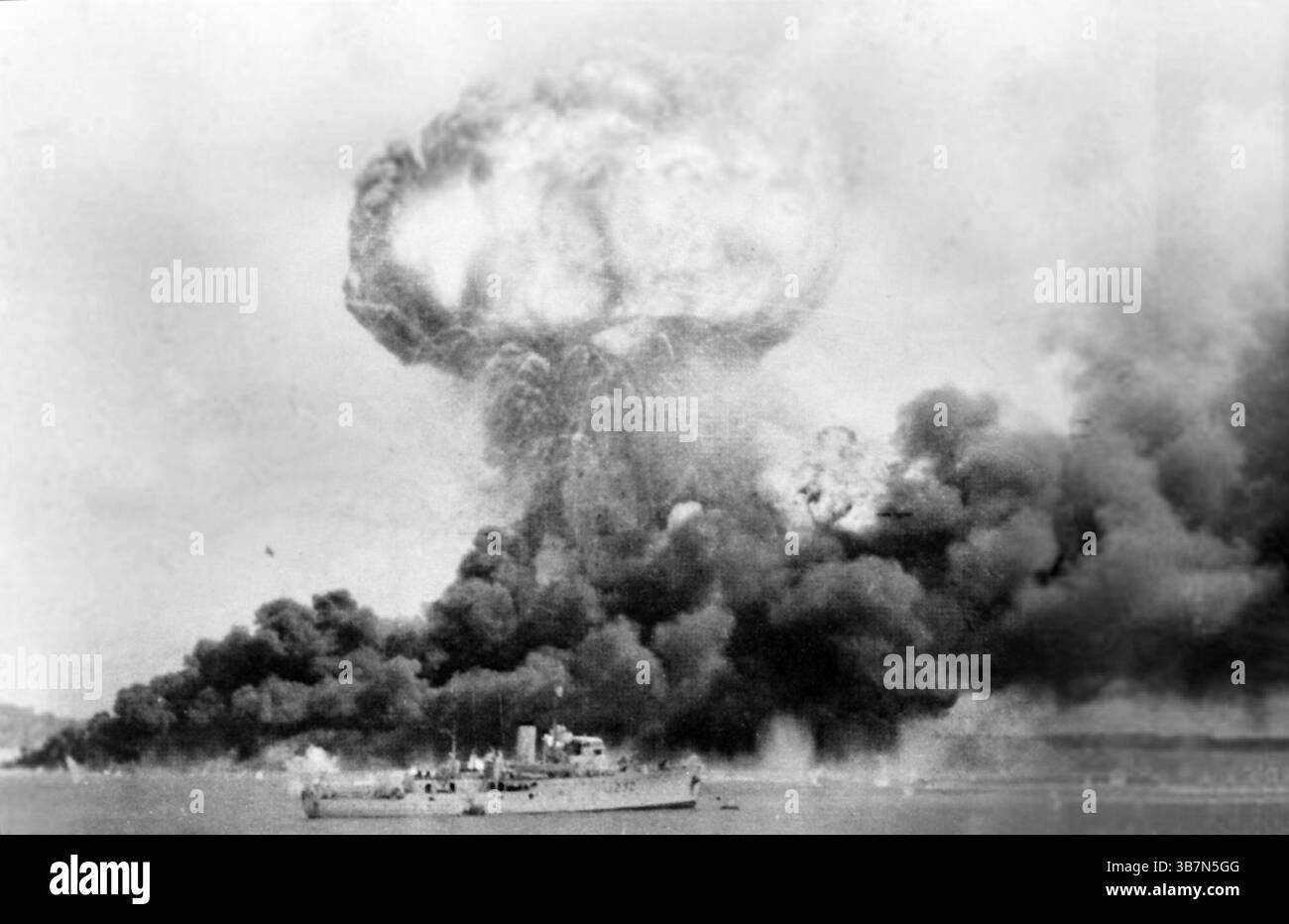 The explosion of the MV Neptuna and clouds of smoke from oil storage ...