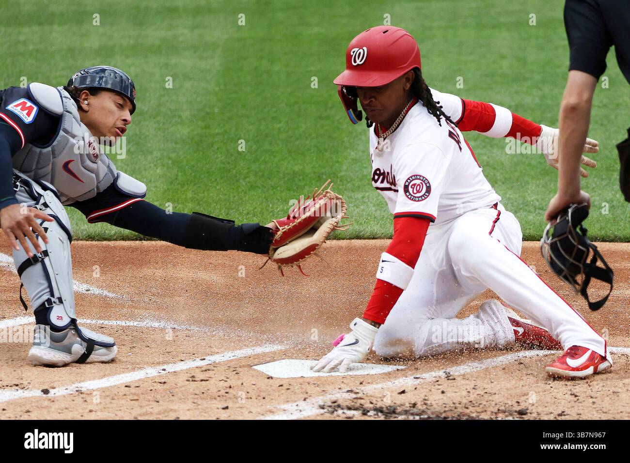 Washington Nationals shortstop CJ Abrams scores during the first inning ...