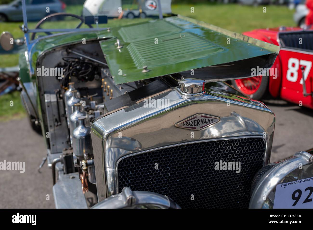 The open bonnet exposing the engine bay of a vintage Frazer Nash Super ...