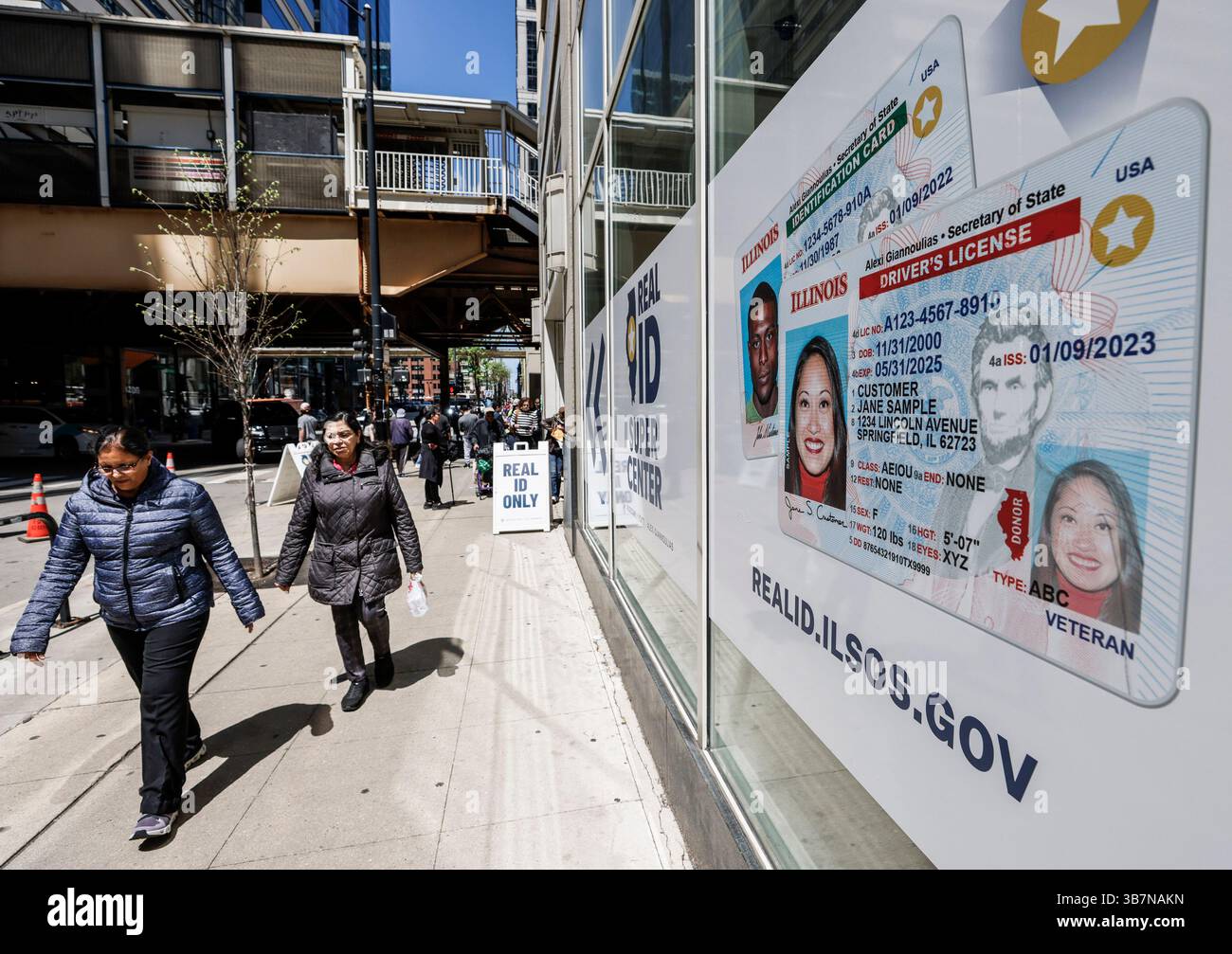 Chicago, United States. 11th Apr, 2025. People walk past the Illinois ...