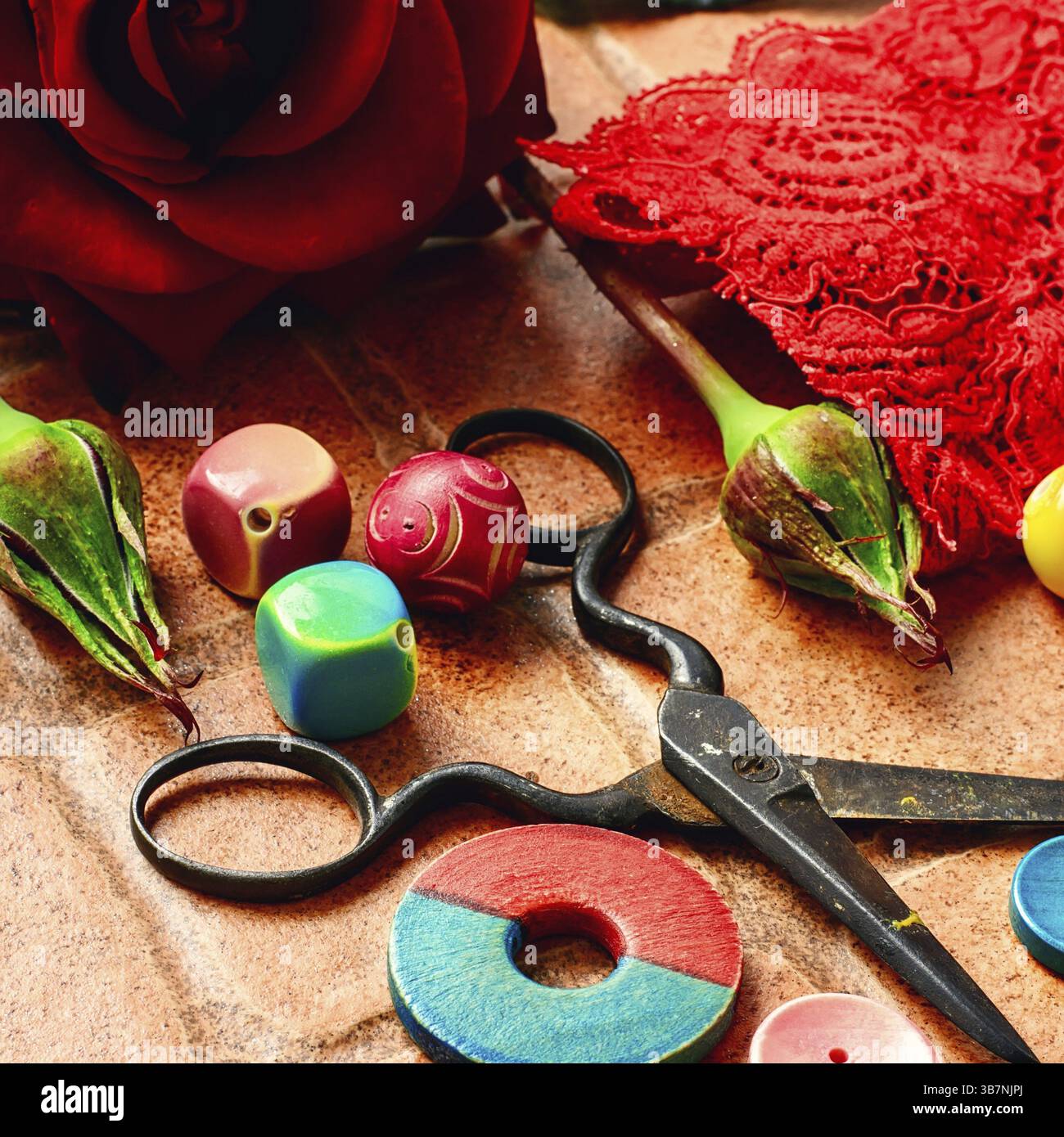 Set for needlework from thread and beads on a stone background Stock ...