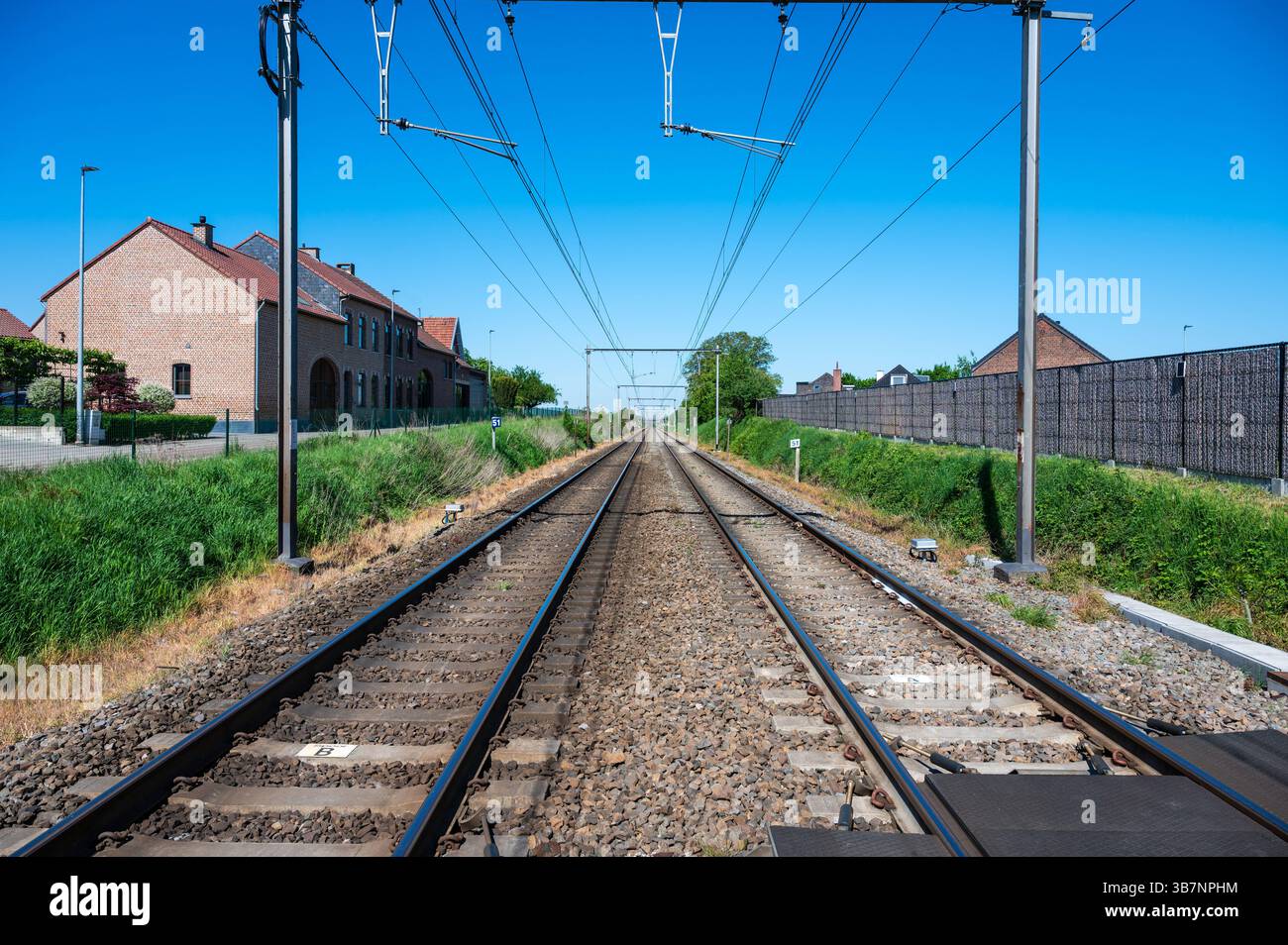 Railway tracks at the countryside, perspective view in Tienen, Flemish ...