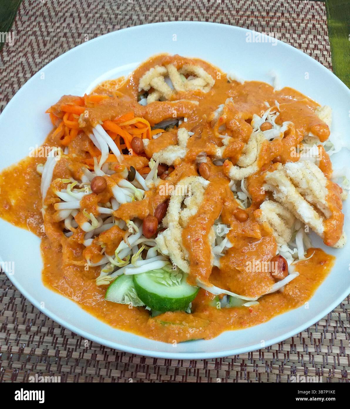 Asinan Betawi or Asinan Jakarta consists of various types of pickled ...