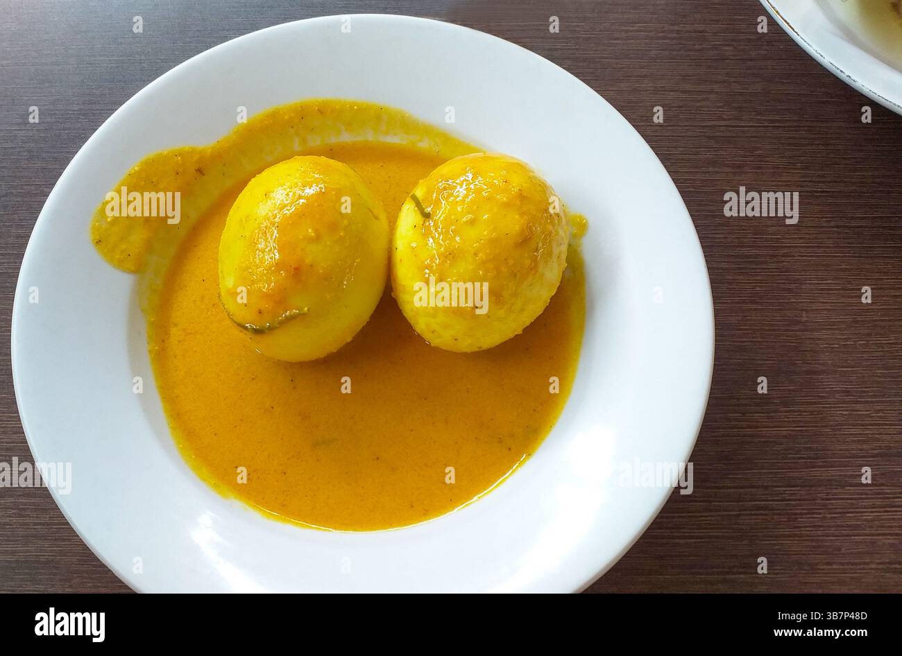 Gulai Telur or Boiled Eggs in Mild Curry Sauce, Indonesian Minangkabau ...