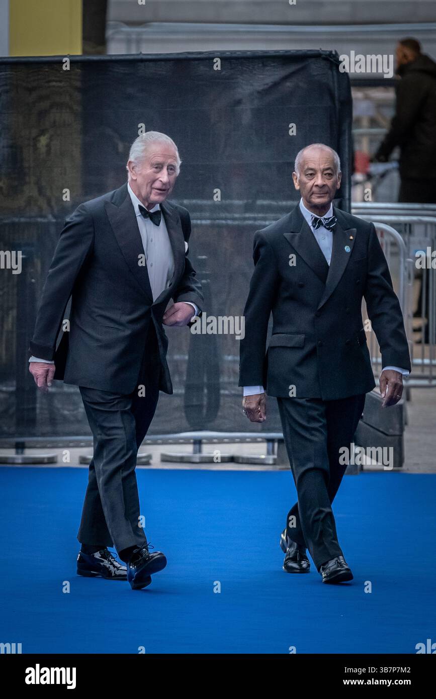 London, UK. 6th May, 2025. King Charles III and Sir Kenneth Olisa ...