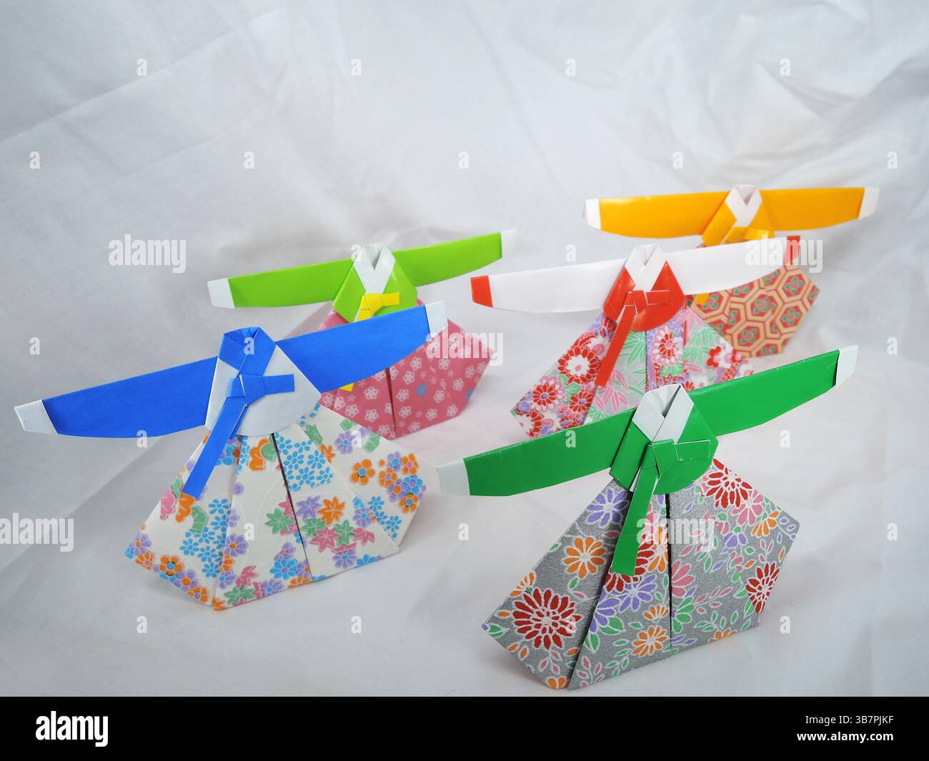 Hanbok origami craft, handcrafted hanbok craft using Japanese origami methods Stock Photo - Alamy