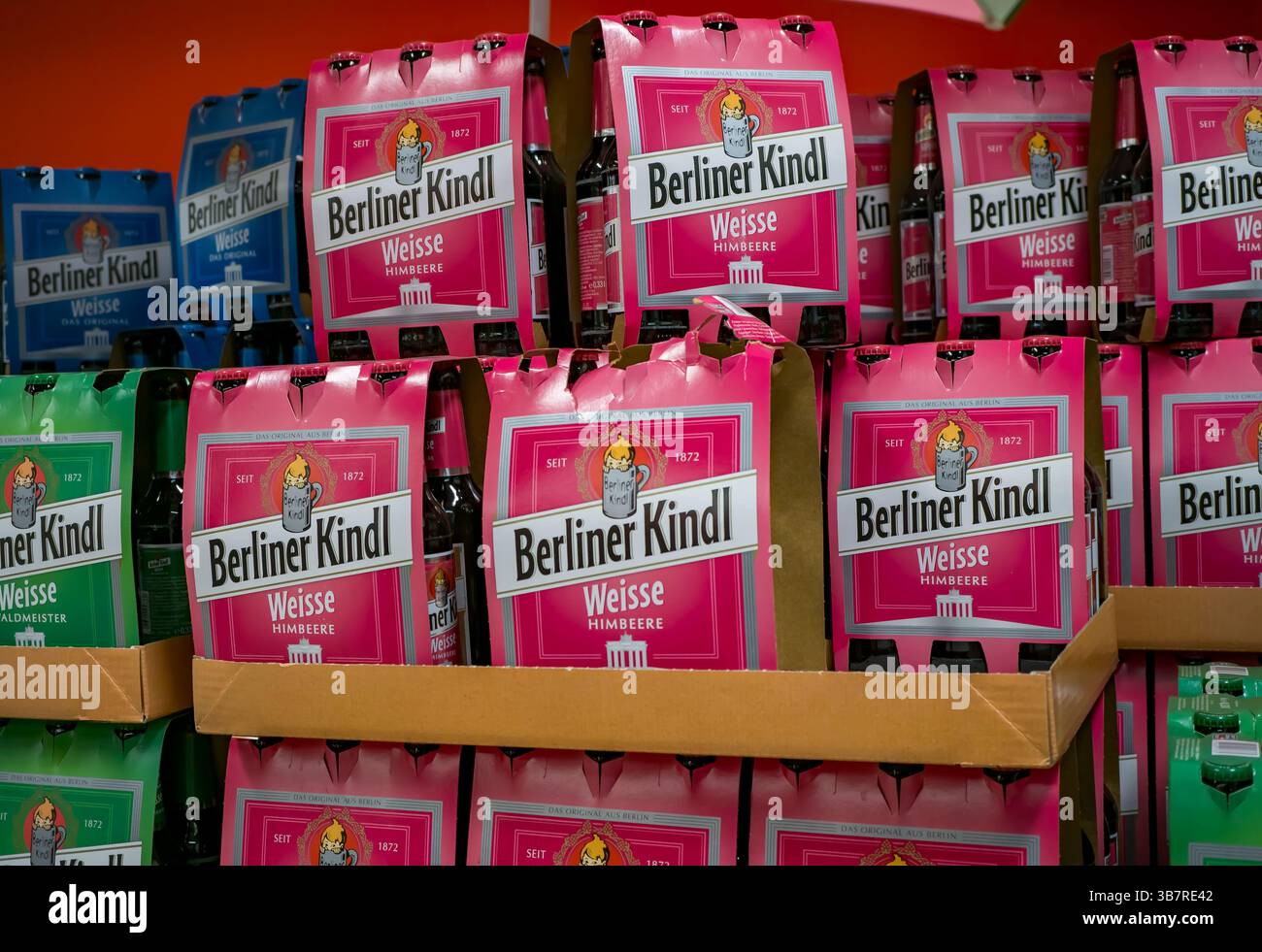 Colorful six-packs of Berliner Kindl Weisse beer on display in a Berlin ...
