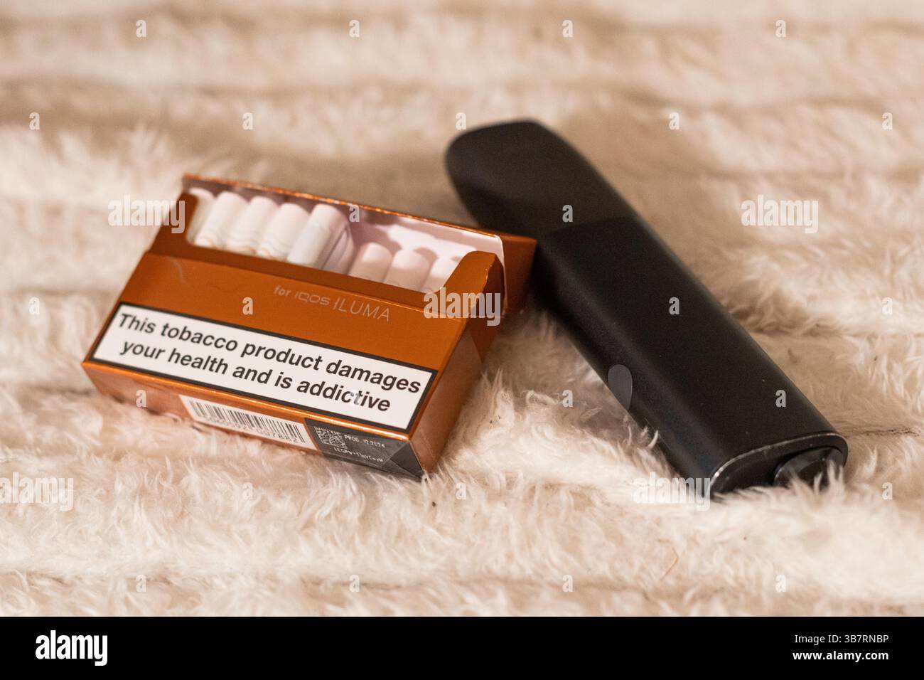 IQOS, a Tobacco heating system by Philip Morris - tobacco product ...