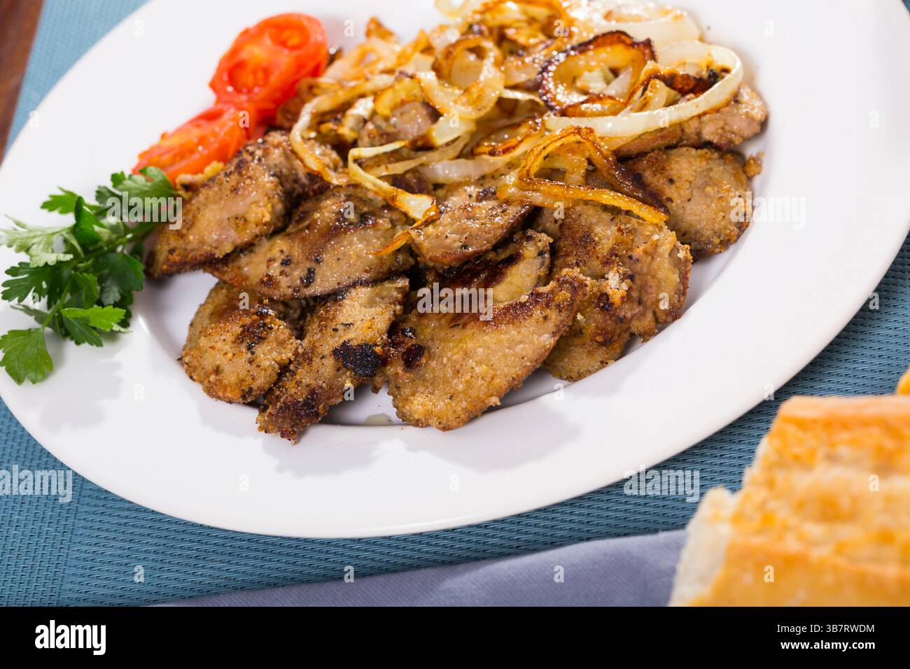Roasted rabbit liver Stock Photo - Alamy