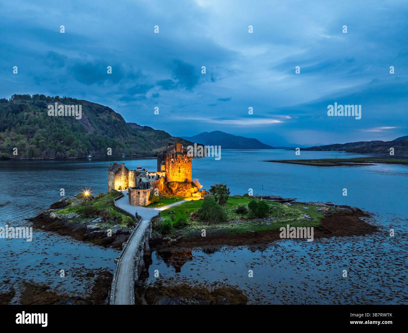 Night over Eilean Donan Castle and Loch Duich from a drone, Isle of Skye, Highlands, Scotland ...