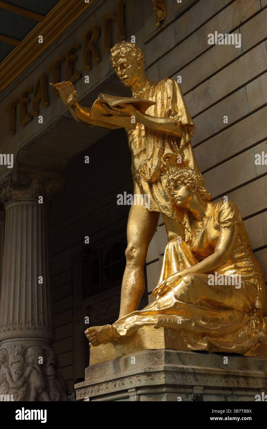 Sweden, Stockholm, Nybroplan. Golden Statues at the main entrance of ...