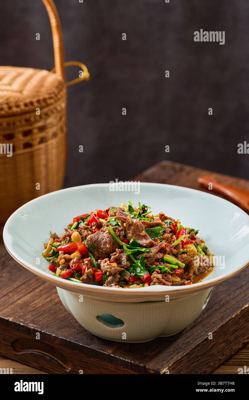 Stir Fried (Sautéed) Beef Strips with beef skin Stock Photo - Alamy