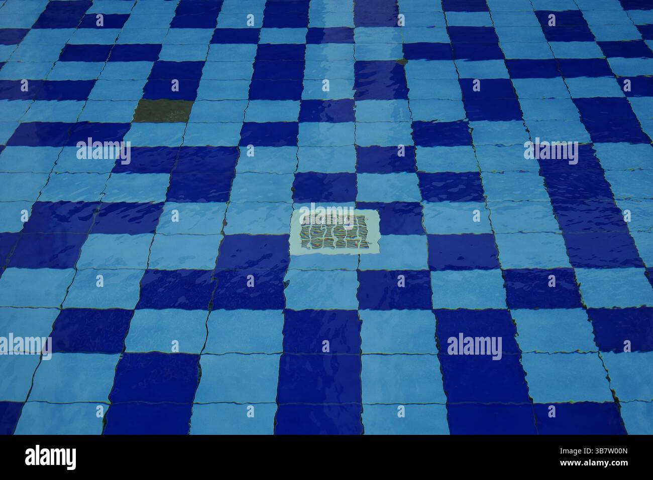 Water drainage grid is placed at the bottom of swimming pool in between ...