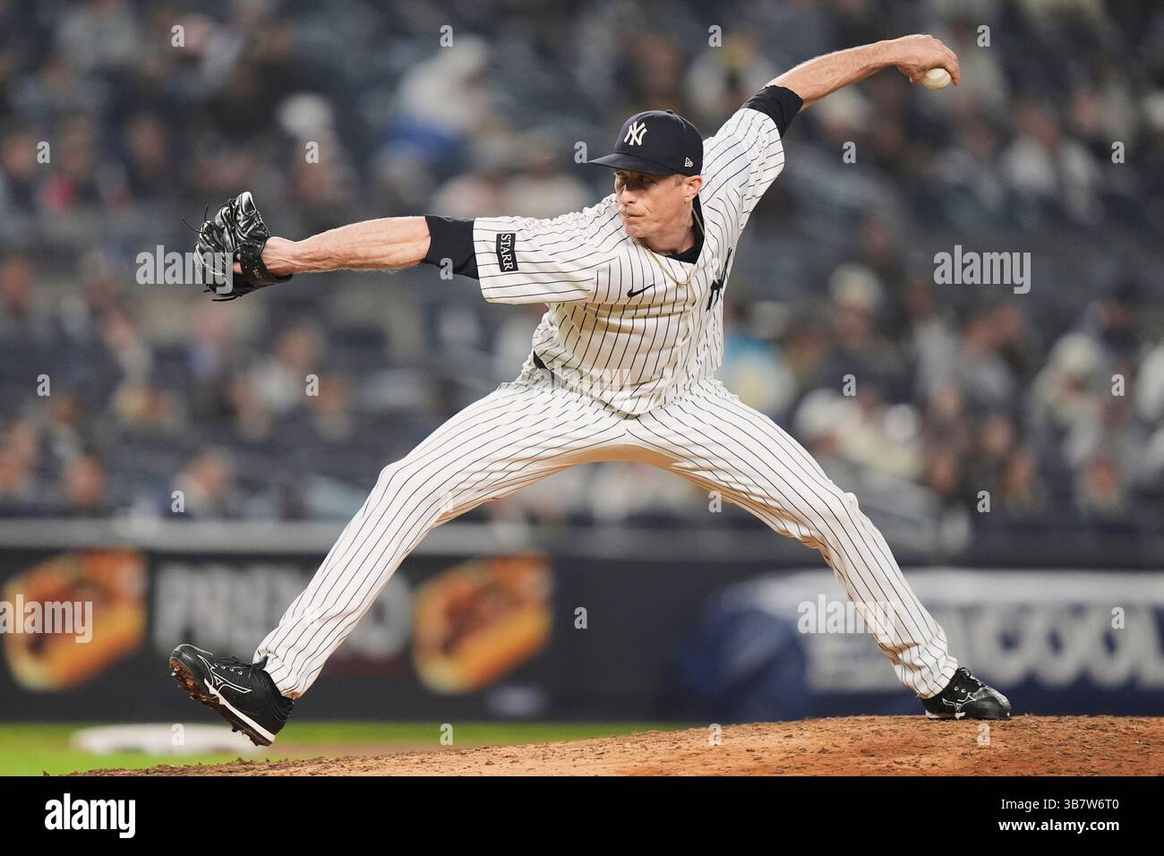 New York Yankees' Tim Hill pitches during the seventh inning of a ...