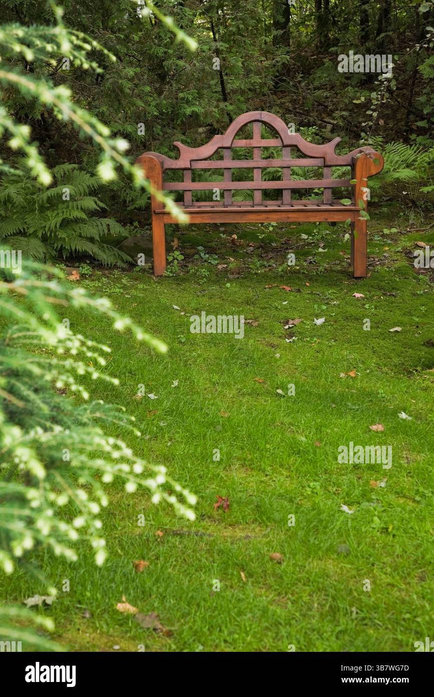 Lutyens style sitting bench in backyard garden in summer Stock Photo ...