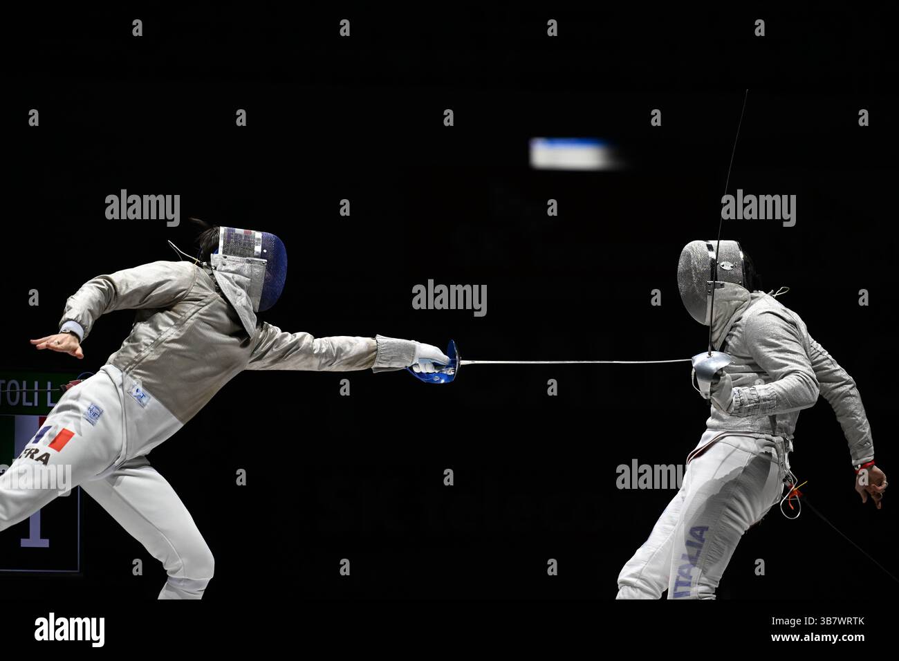 France's Jean-Philippe Patrice (L) fights against Italy's Luca Curatoli ...