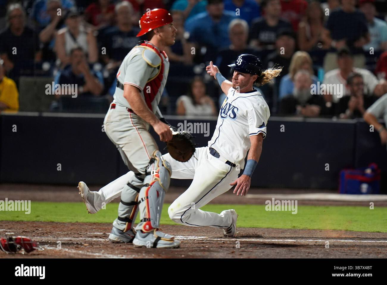 Tampa Bay Rays' Travis Jankowski, right, scores behind Philadelphia ...