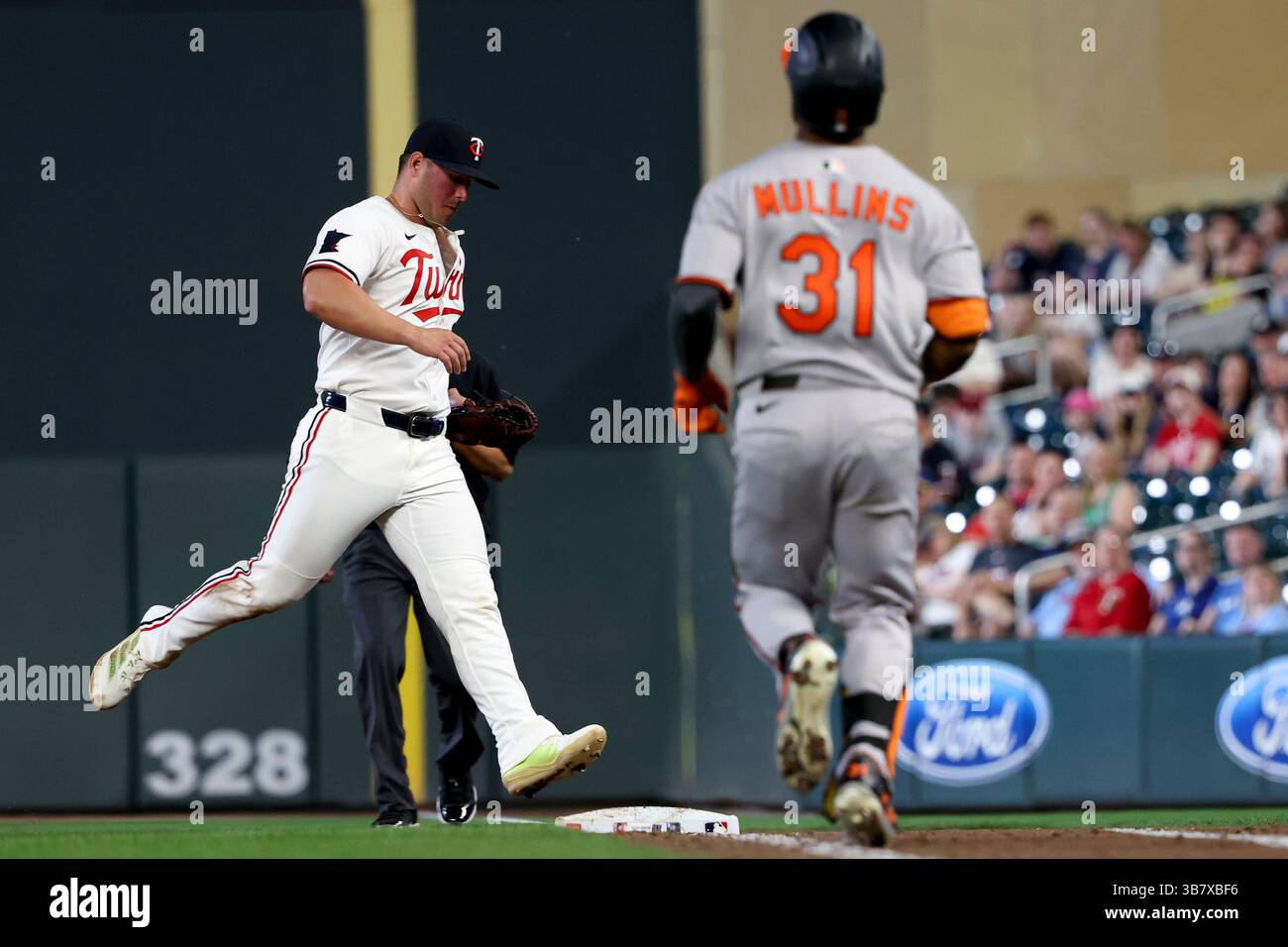 Minnesota Twins first baseman Ty France (13) gets an out on Baltimore ...