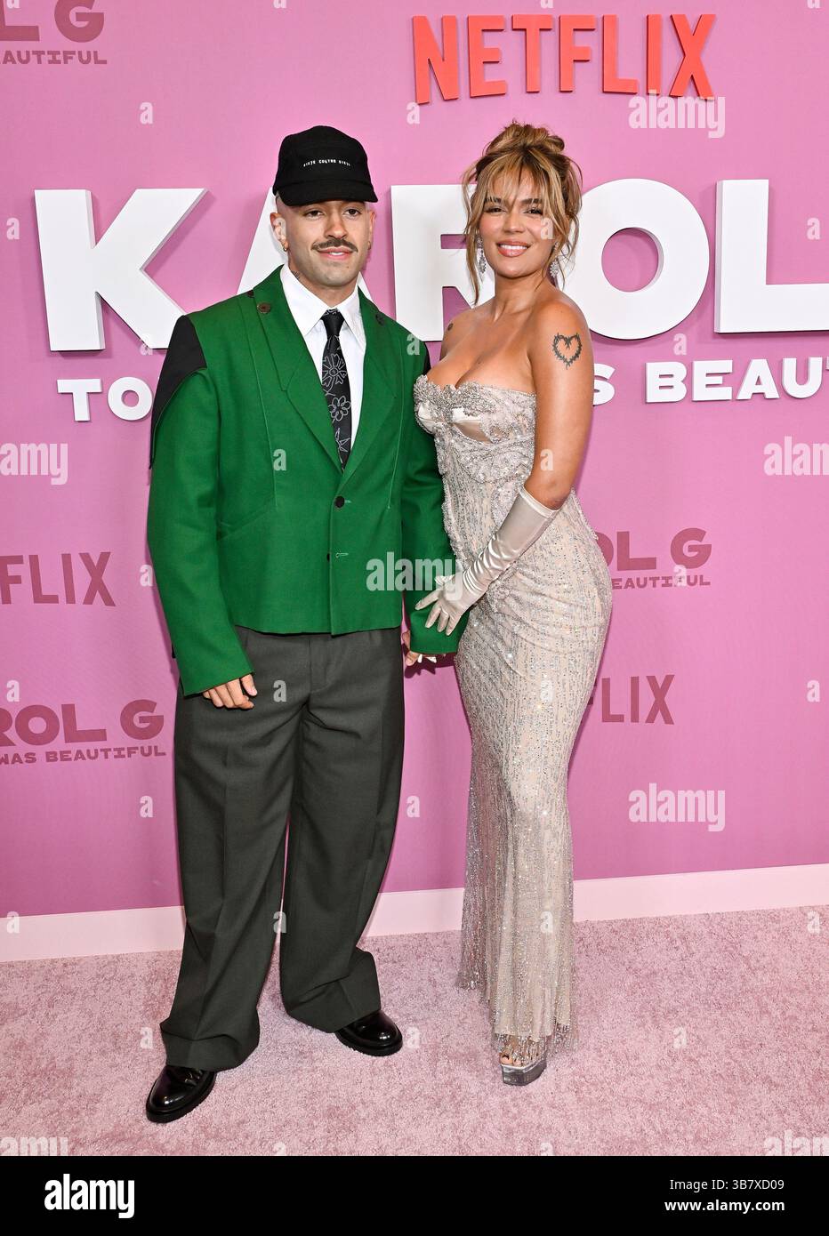 Colombian singer-songwriter Karol G, right, and Feid attend the special ...