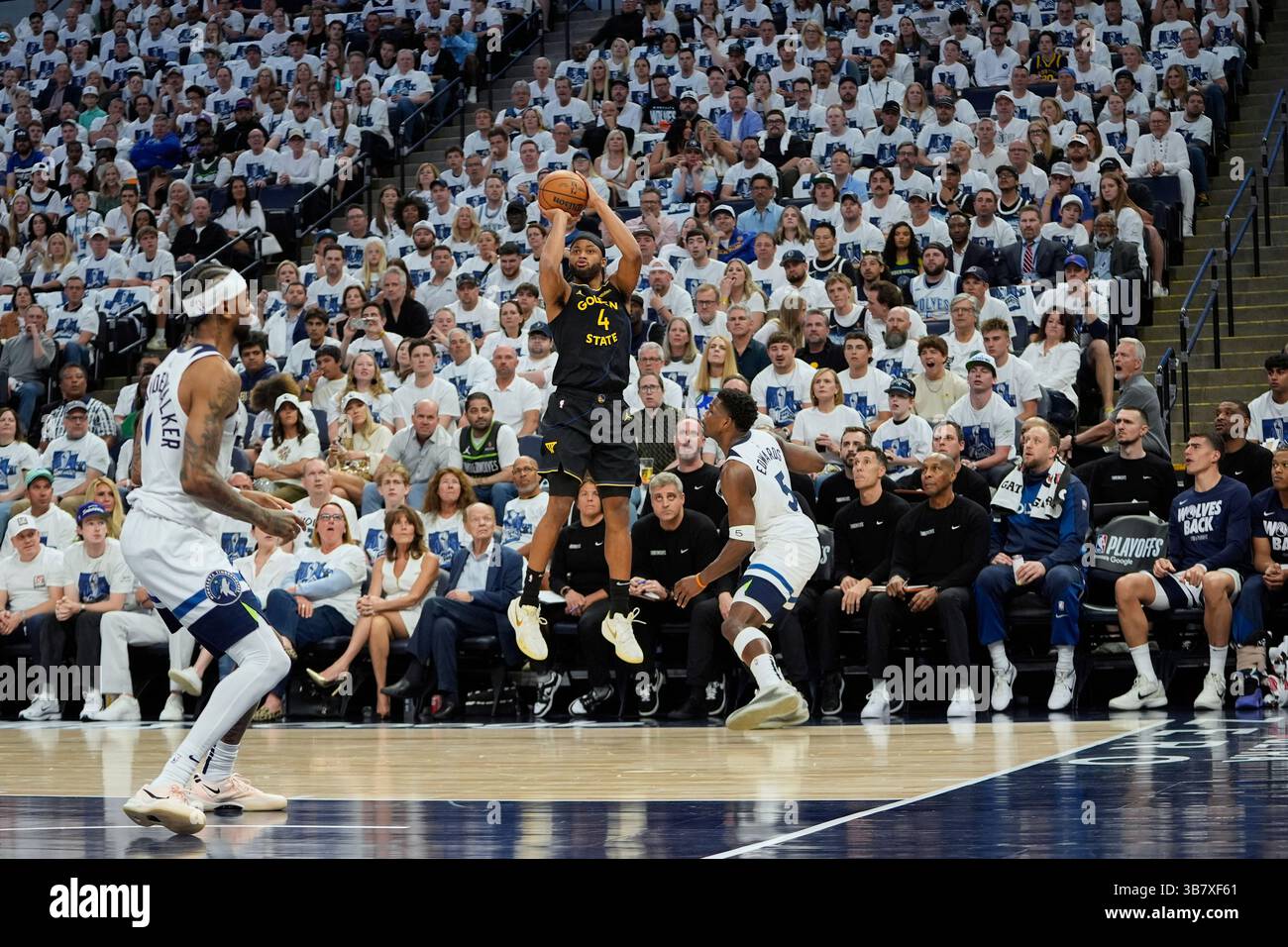 Golden State Warriors guard Moses Moody (4) shoots over Minnesota ...