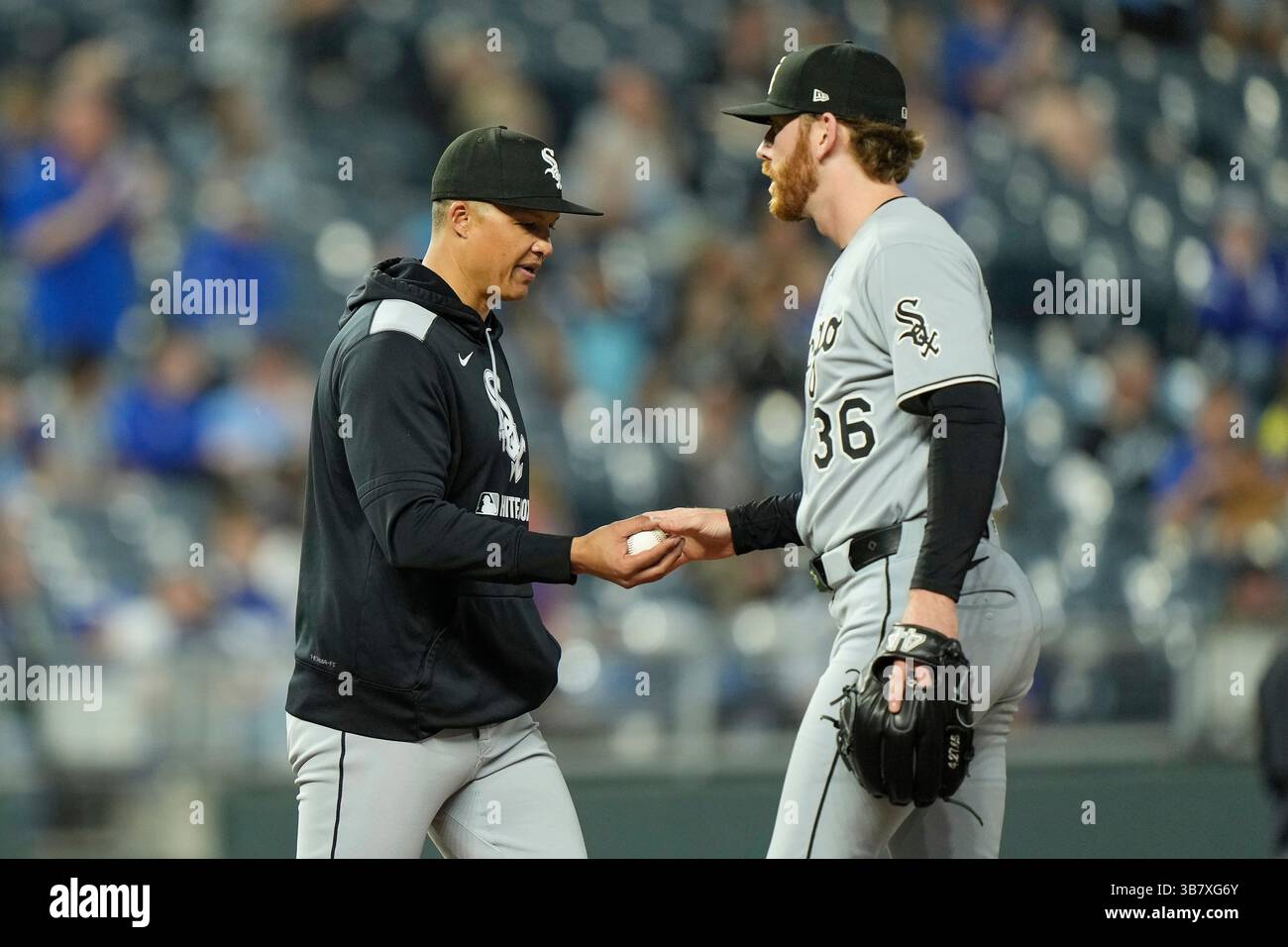 Chicago White Sox manager Will Venable takes the ball from relief ...