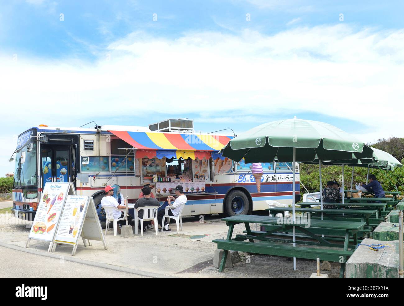 An old bus used as the Blue Seal Ice Cream shop in Cape Zanpa, Okinawa ...