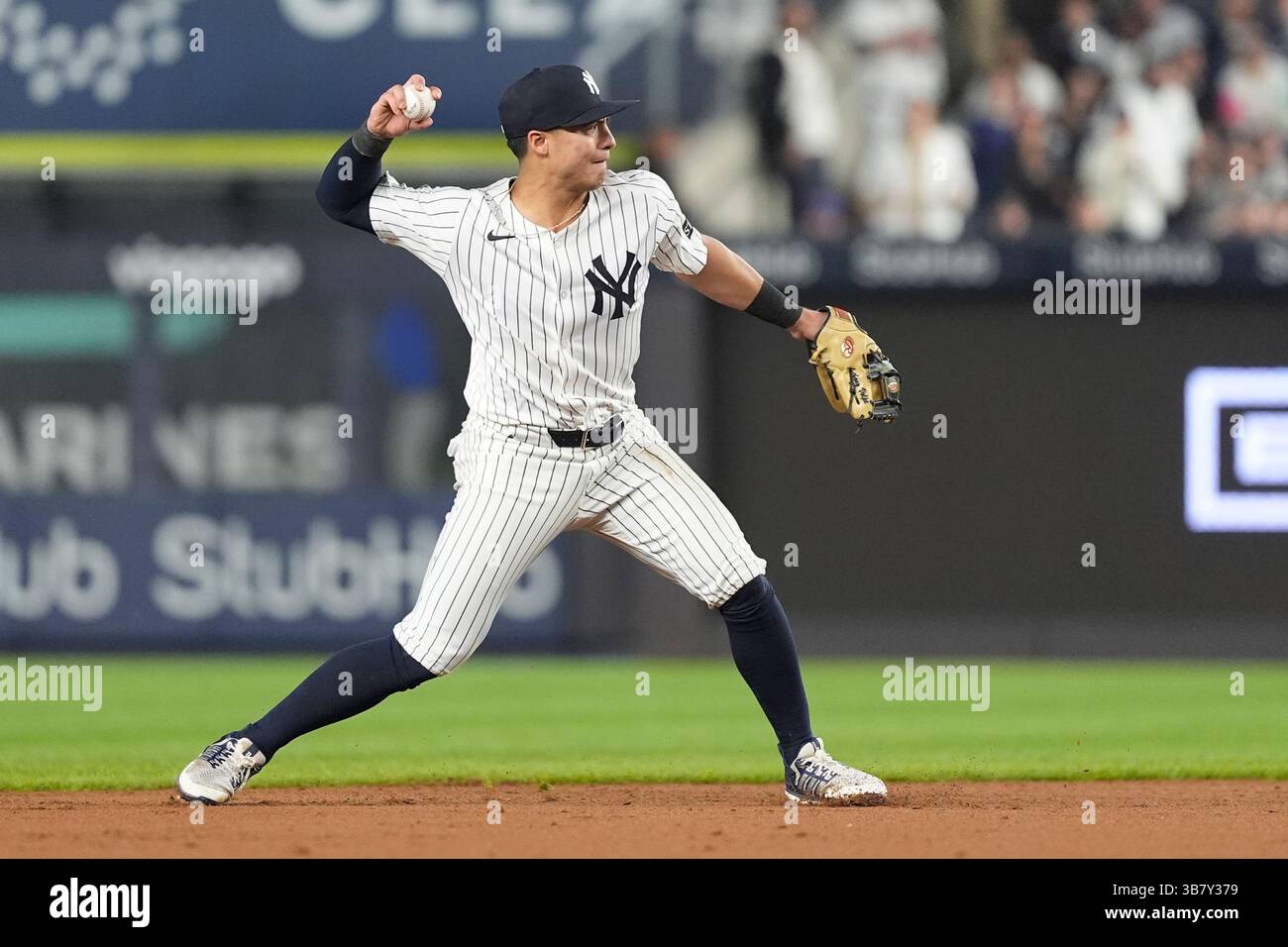 BRONX, NY - MAY 06: New York Yankees Shortstop Anthony Volpe (11) throws out San Diego Padres ...