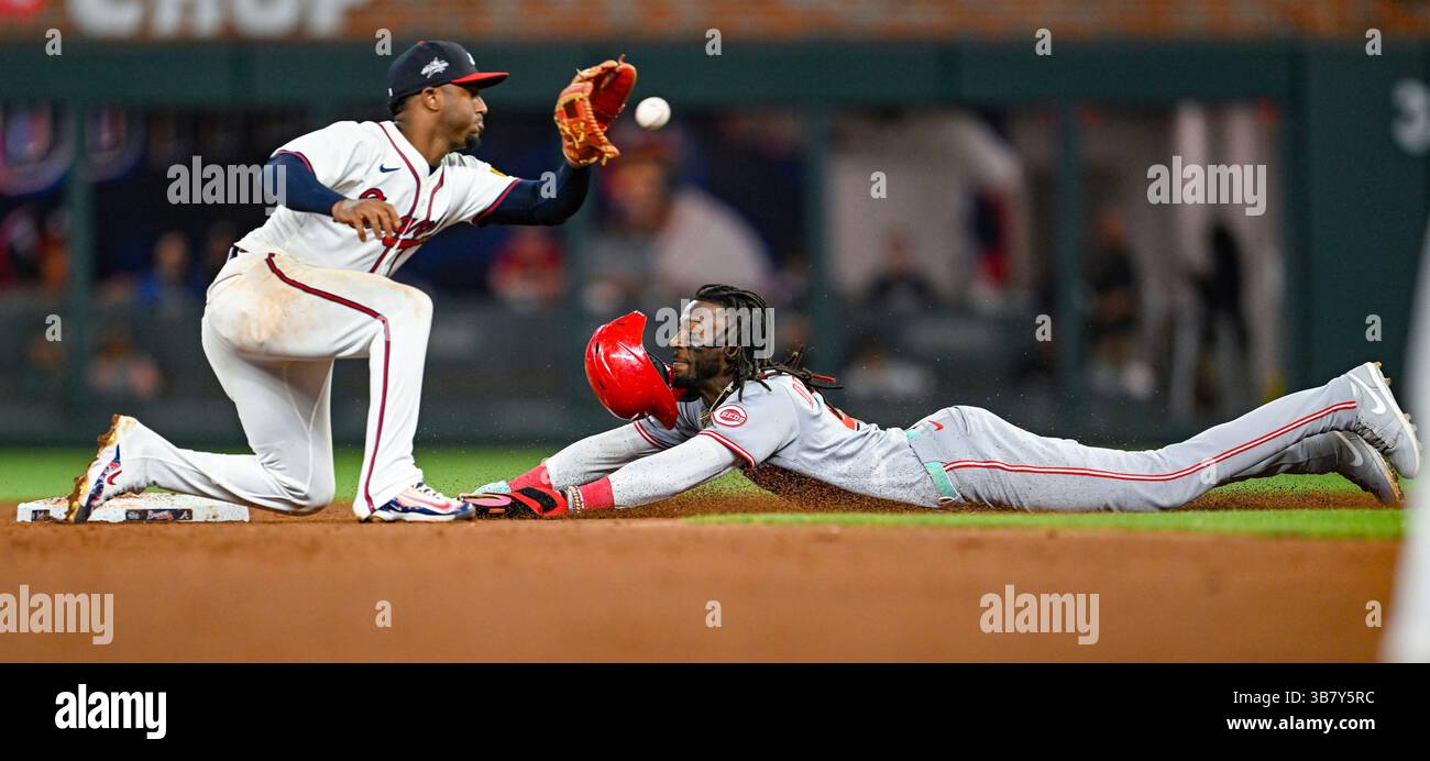 ATLANTA, GA – MAY 06: Cincinnati shortstop Elly De La Cruz (44) steals second base as Atlanta ...