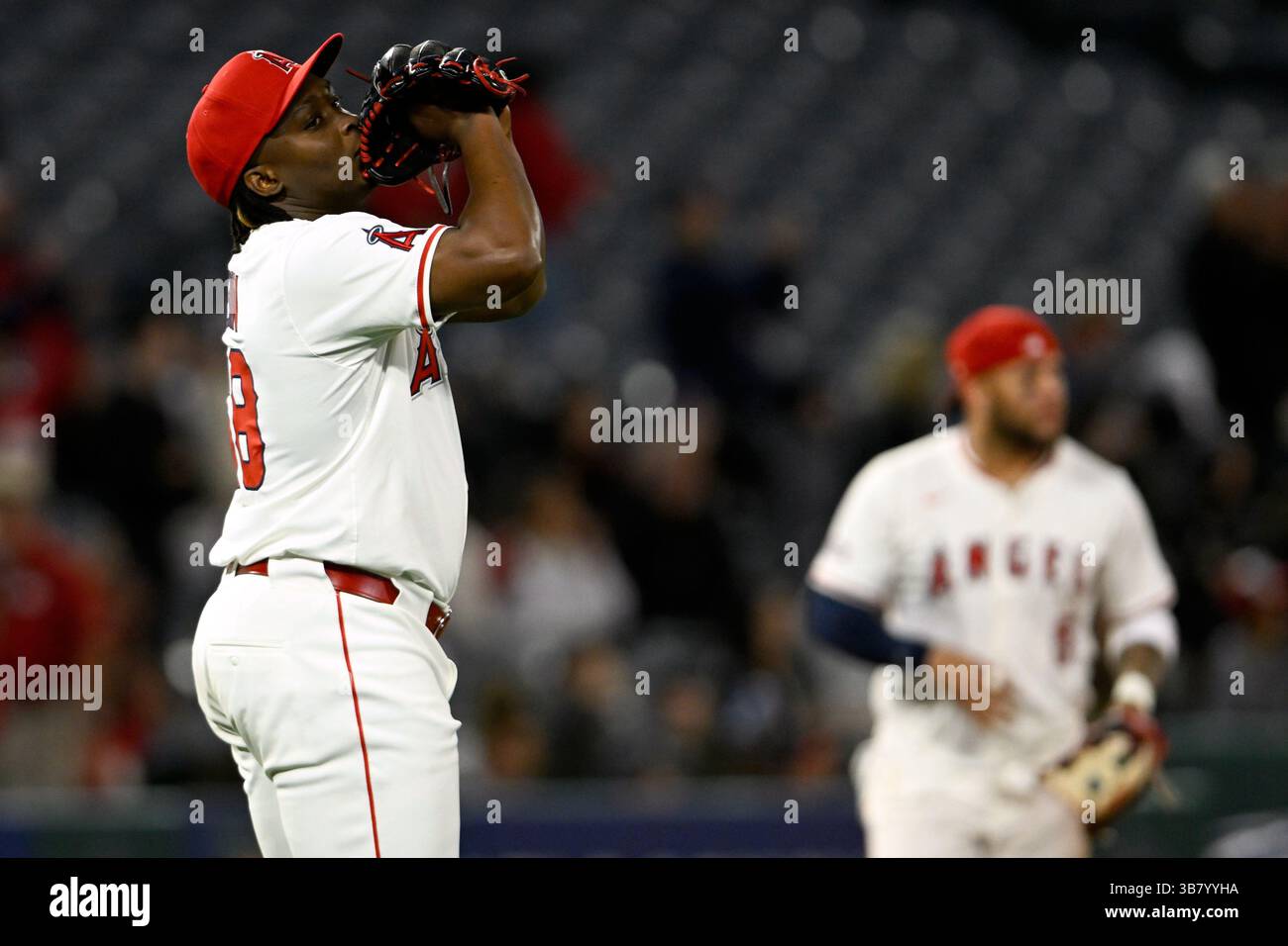 Los Angeles Angels relief pitcher Jose Fermin reacts after the last out ...
