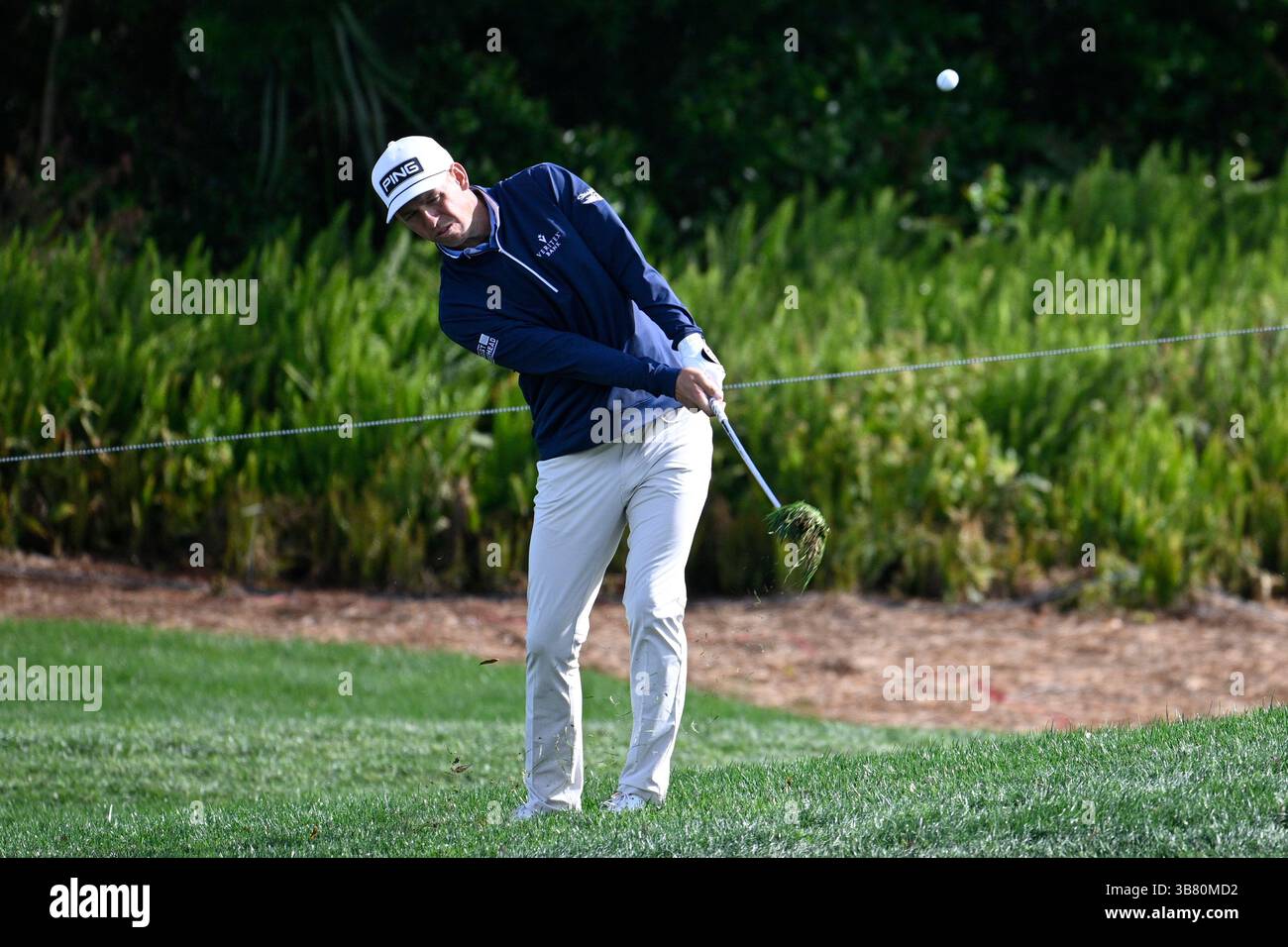 Sam Stevens hits from the rough alongside the eighth fairway during the ...