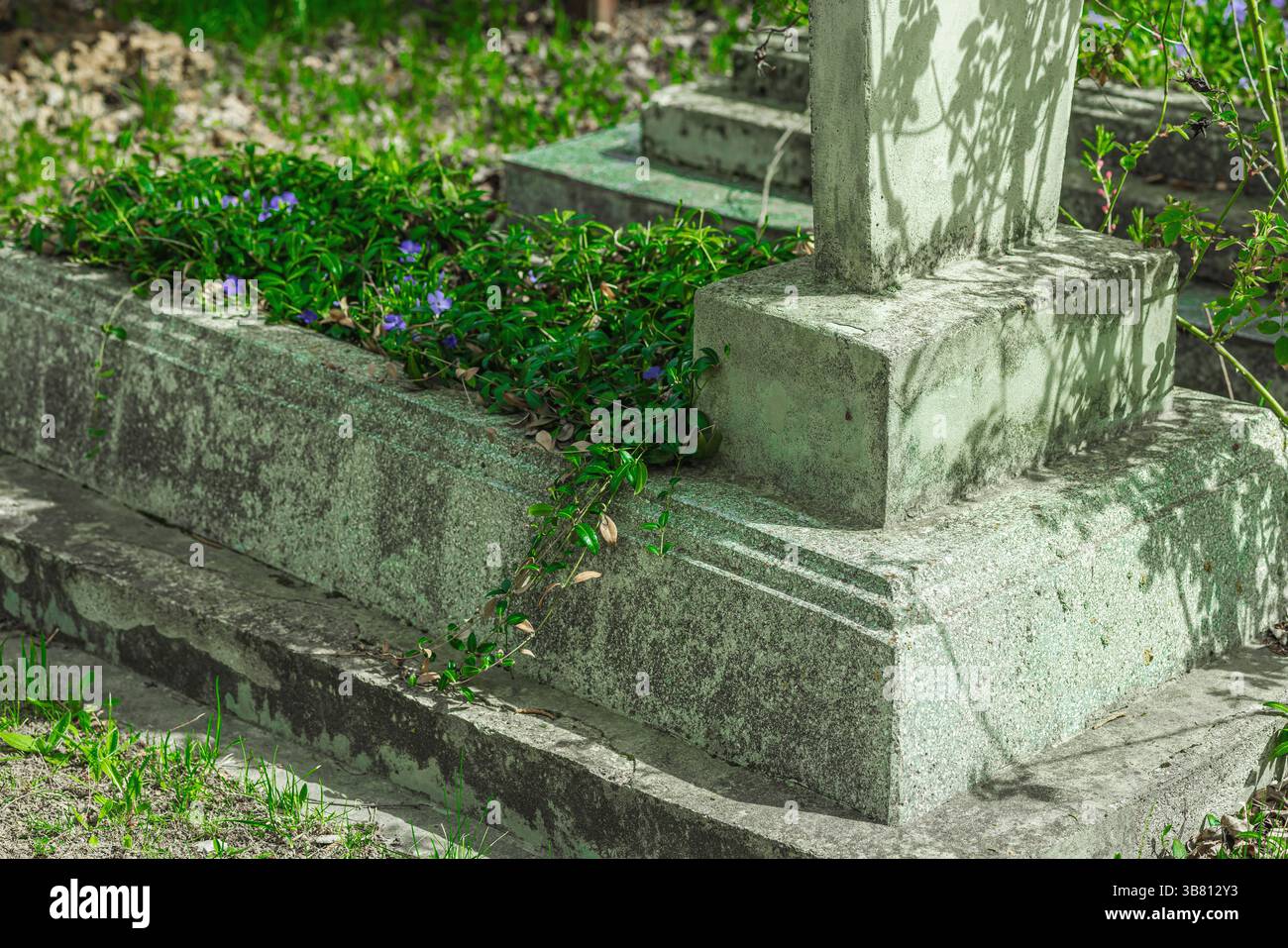 Memory Day concept. Ancient cemetery with stone graves in a quiet rural ...