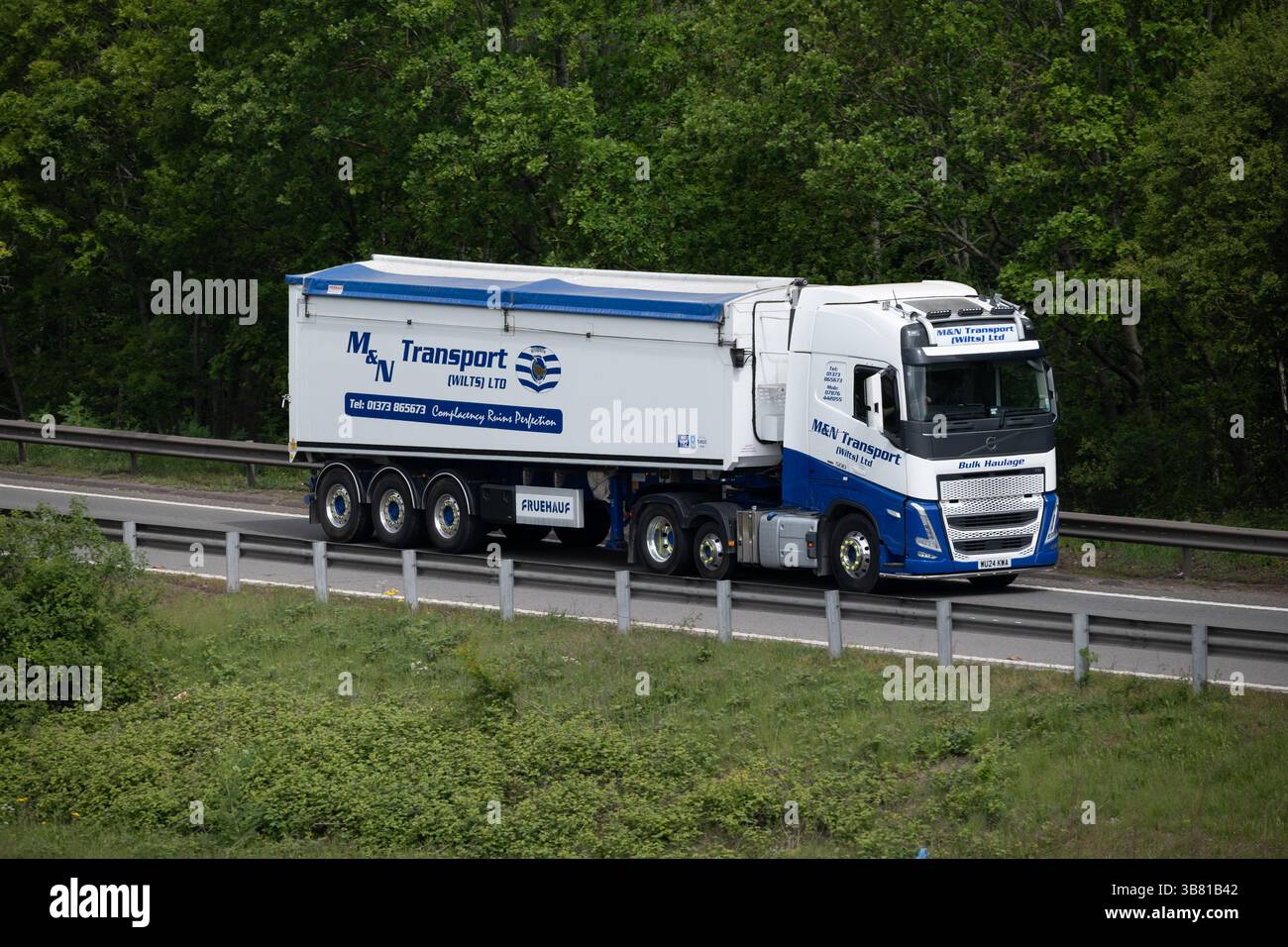 M&N Transport Volvo lorry joining the M40 motorway at Junction 15 ...