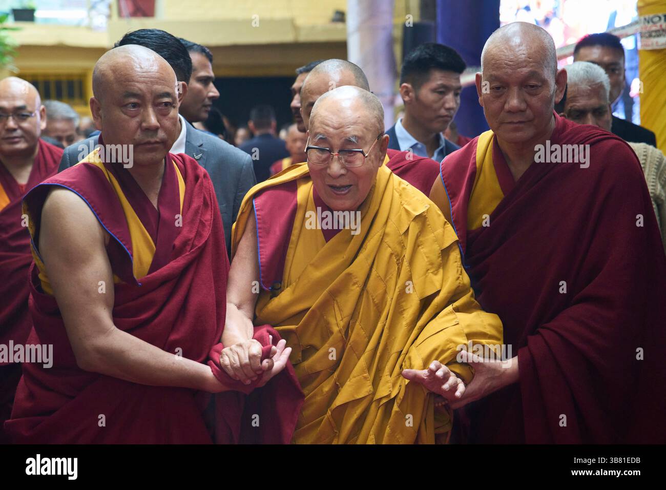 Tibetan spiritual leader the Dalai Lama leaves the Tsuglakhang temple ...