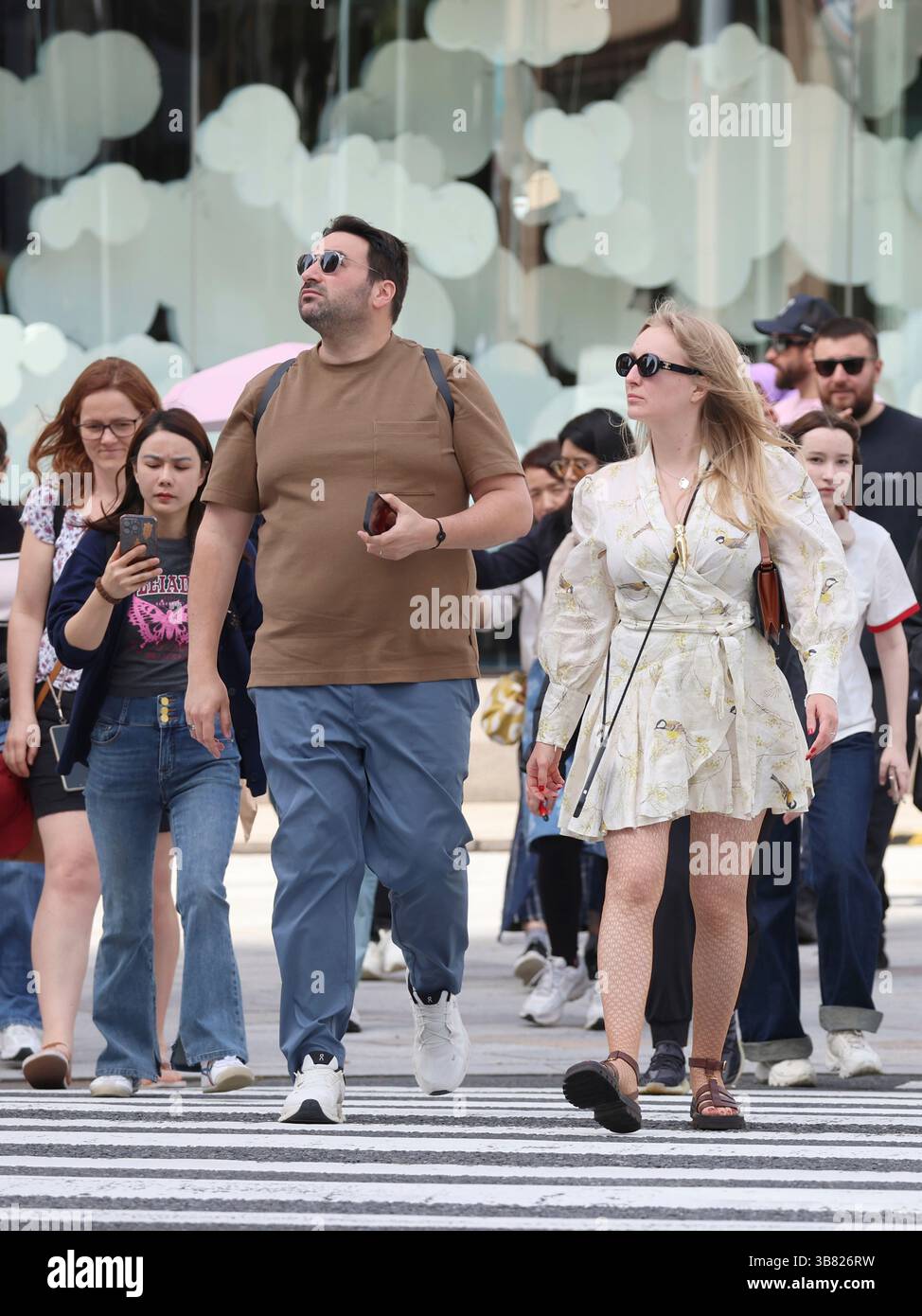 People walk amid comfortable amid comfortable temperature at Ginza ...