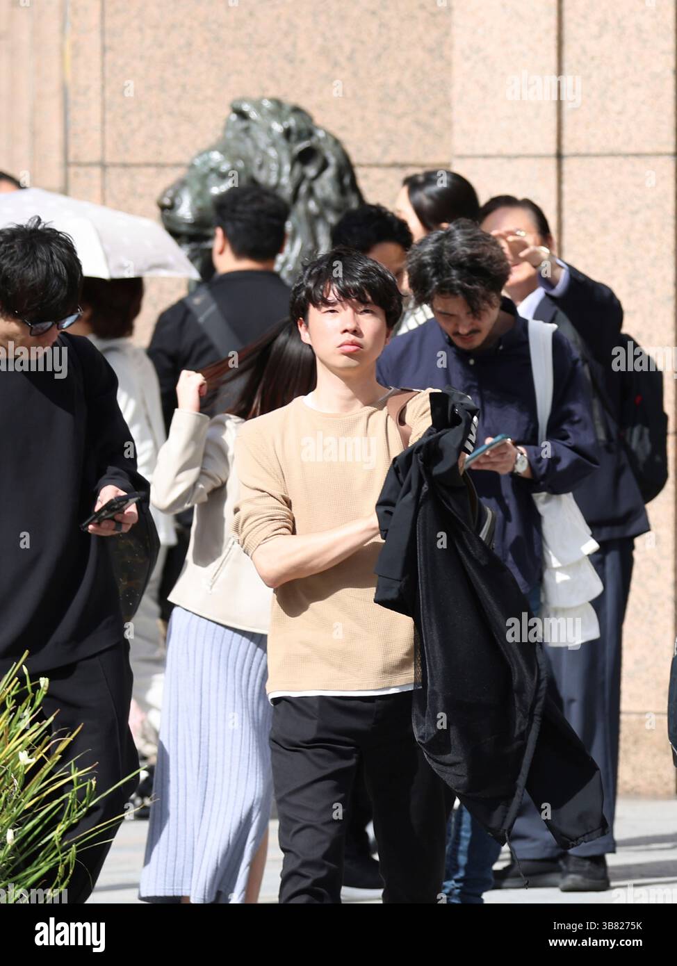 People walk amid comfortable amid comfortable temperature at Ginza ...