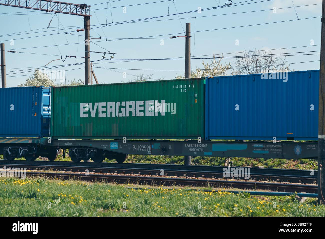 Mir, Belarus. April 25, 2025. Evergreen freight railway carriage on a ...