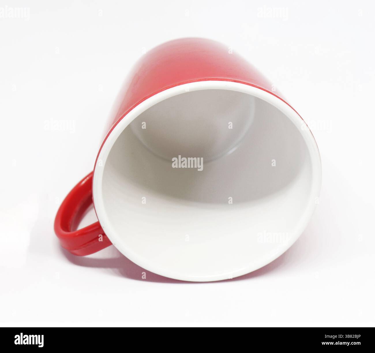 A vibrant, close-up perspective of a ceramic mug displaying a bright ...
