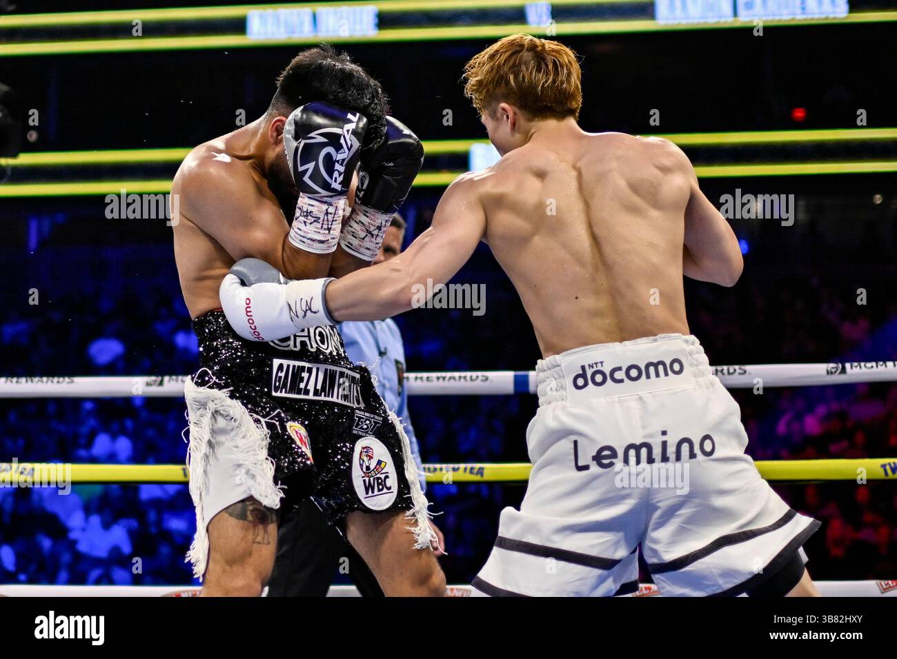 Champion Naoya Inoue (white gloves) of Japan and Ramon Cardenas (black ...