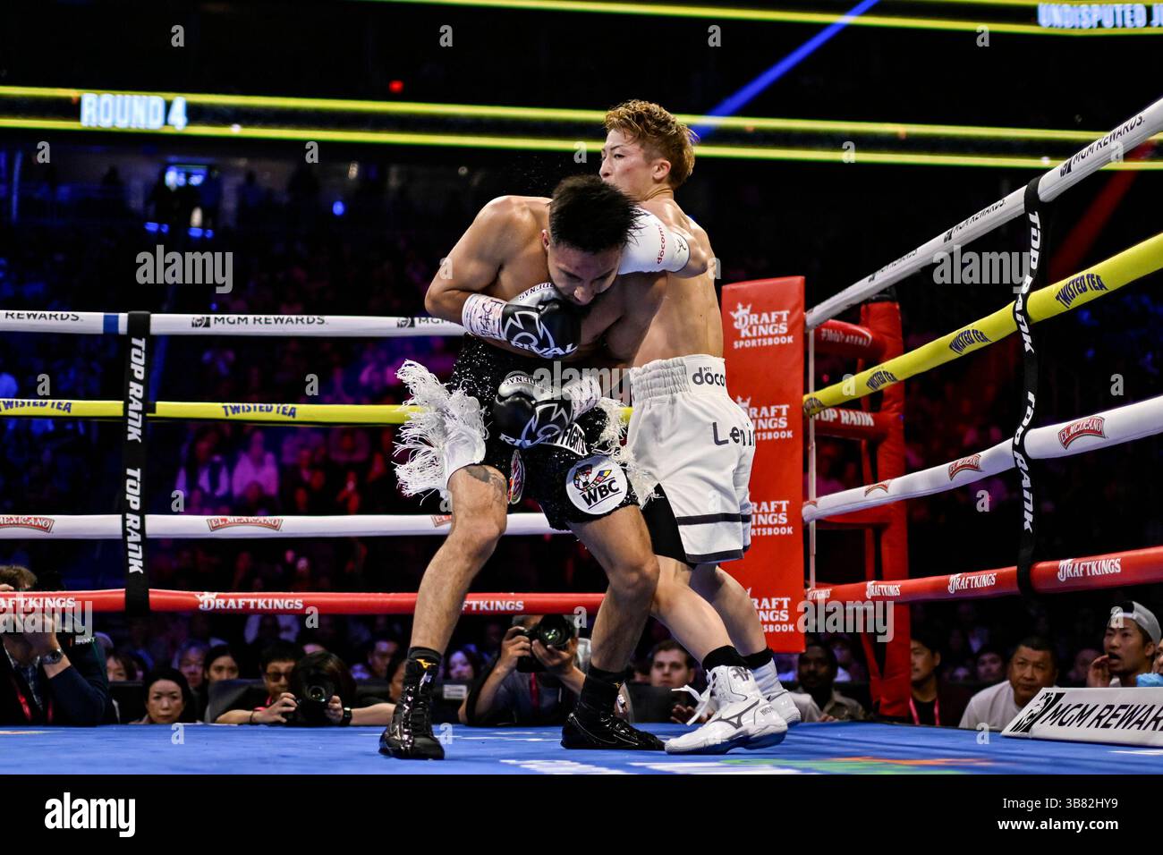 Champion Naoya Inoue (white gloves) of Japan and Ramon Cardenas (black ...