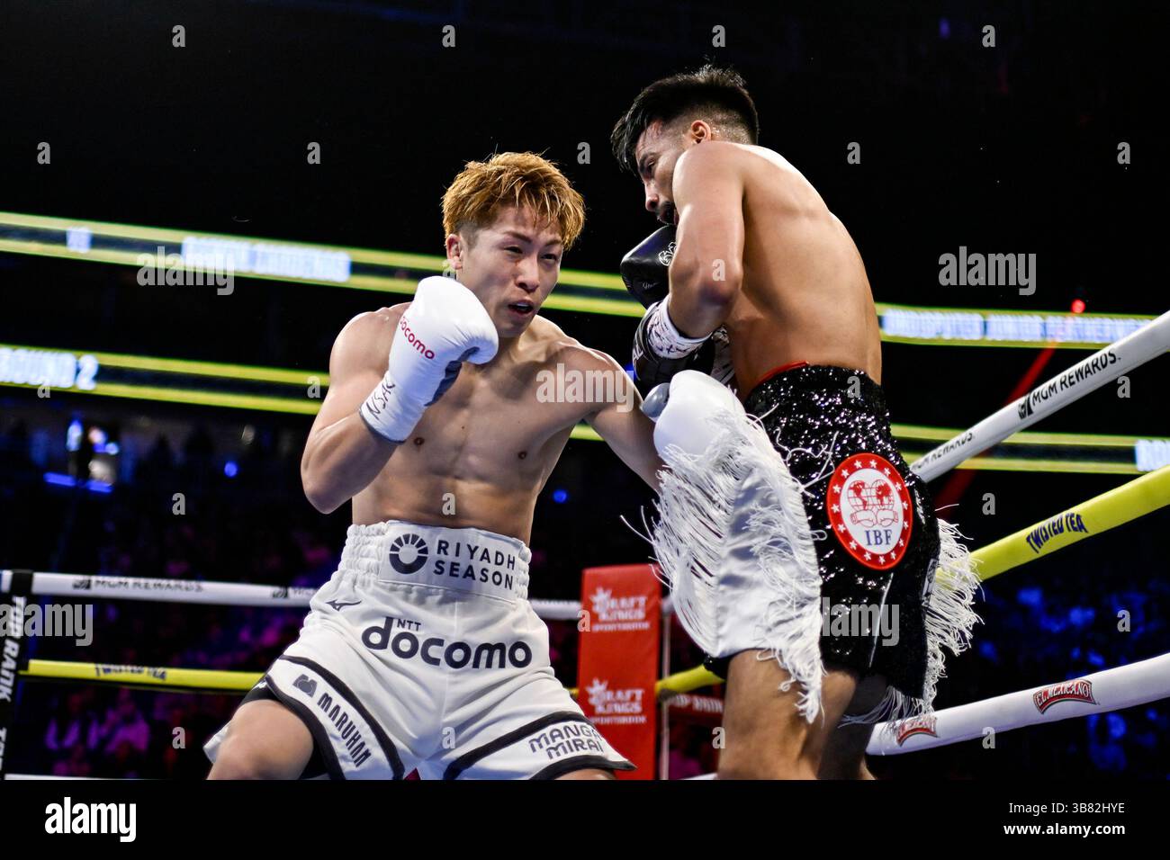 Champion Naoya Inoue (white gloves) of Japan and Ramon Cardenas (black ...